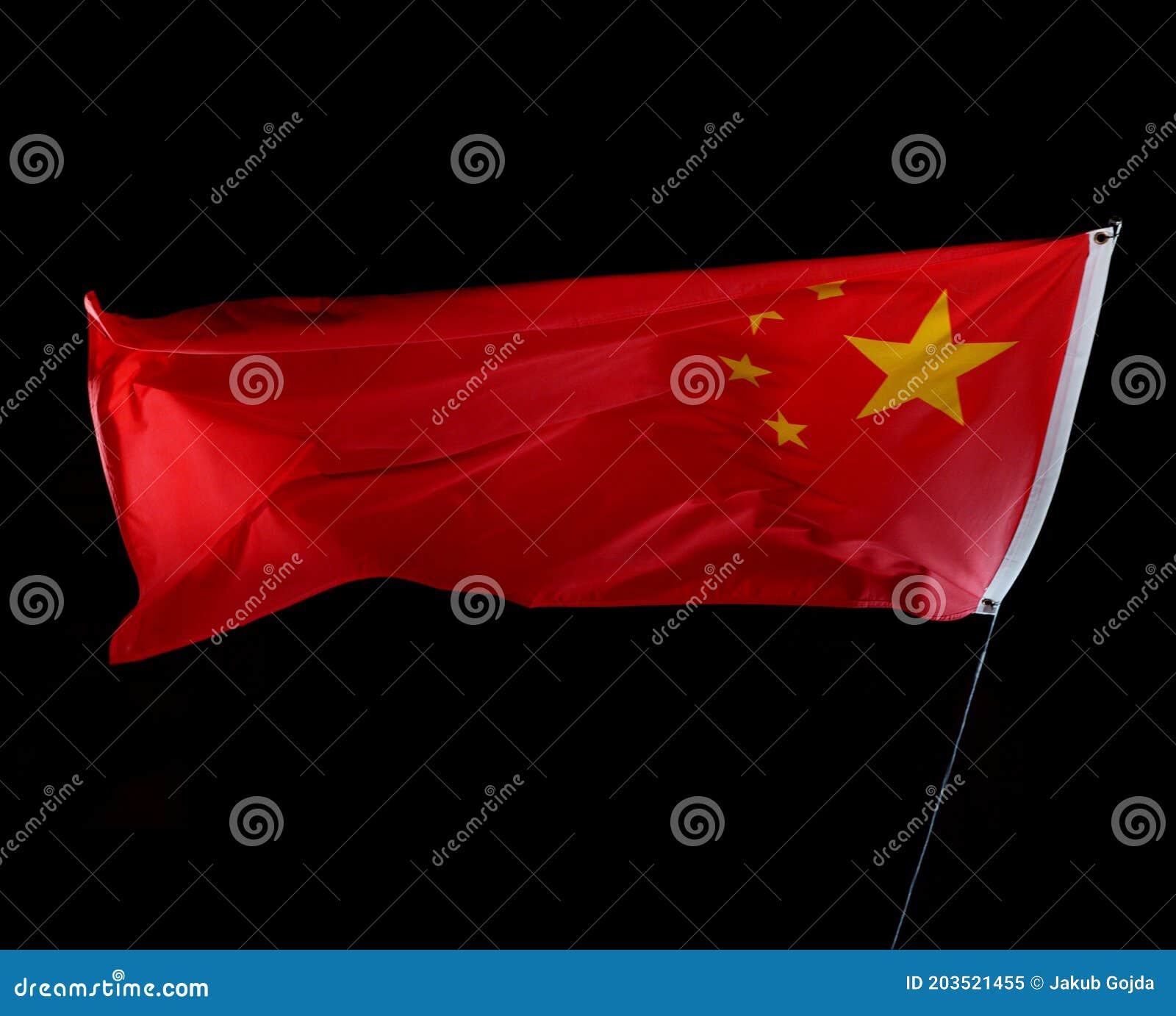 Chinese Flag Blowing in the Wind Isolated Against a Black Background ...