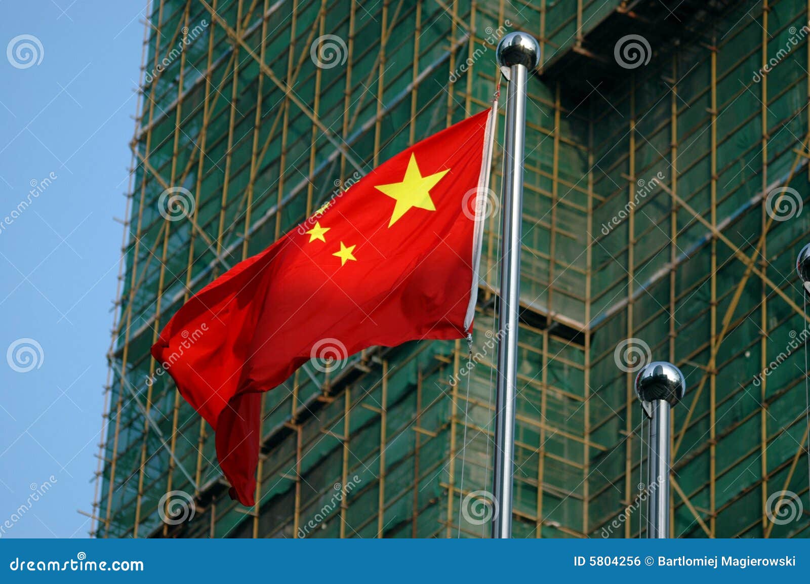 Chinese Flag with Buildings Behind Stock Photo - Image of closeup, flat ...