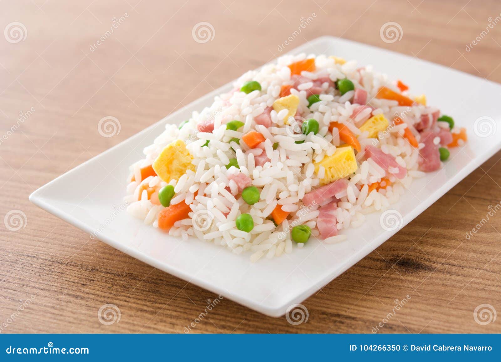 Chinese Fried Rice with Vegetables and Omelette on Wooden Table. Stock ...