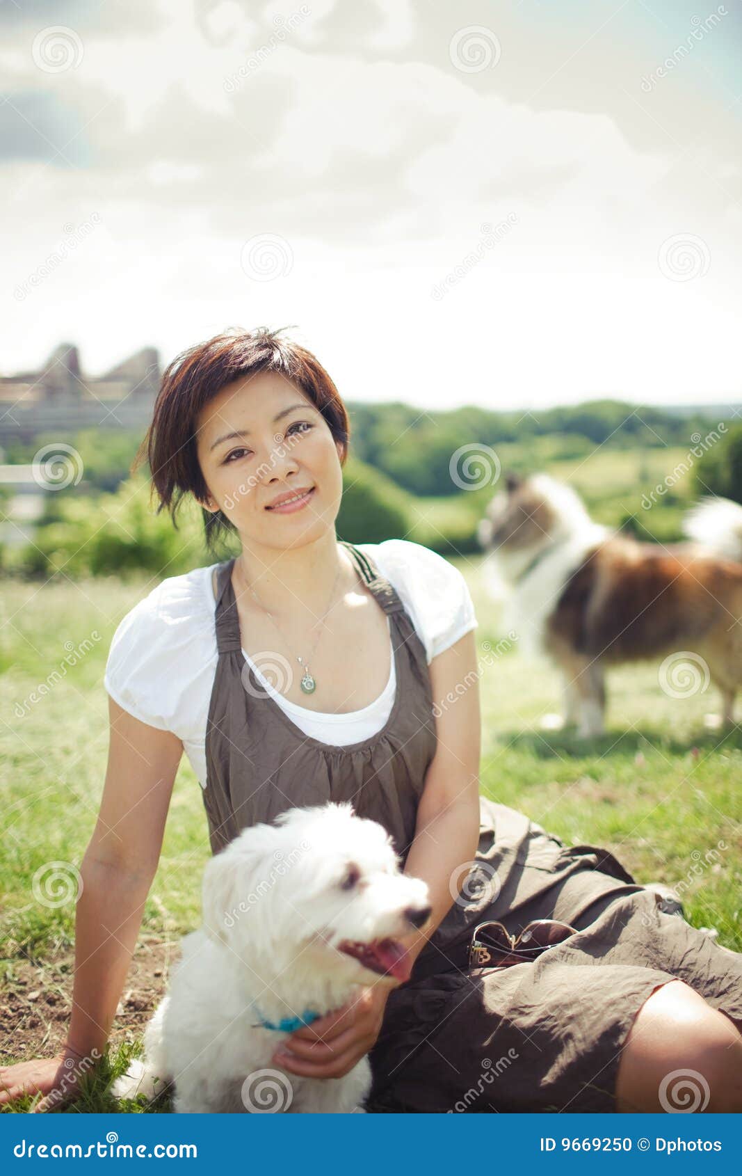Chinese girl with a dog stock photo. Image of grass, beauty - 9669250