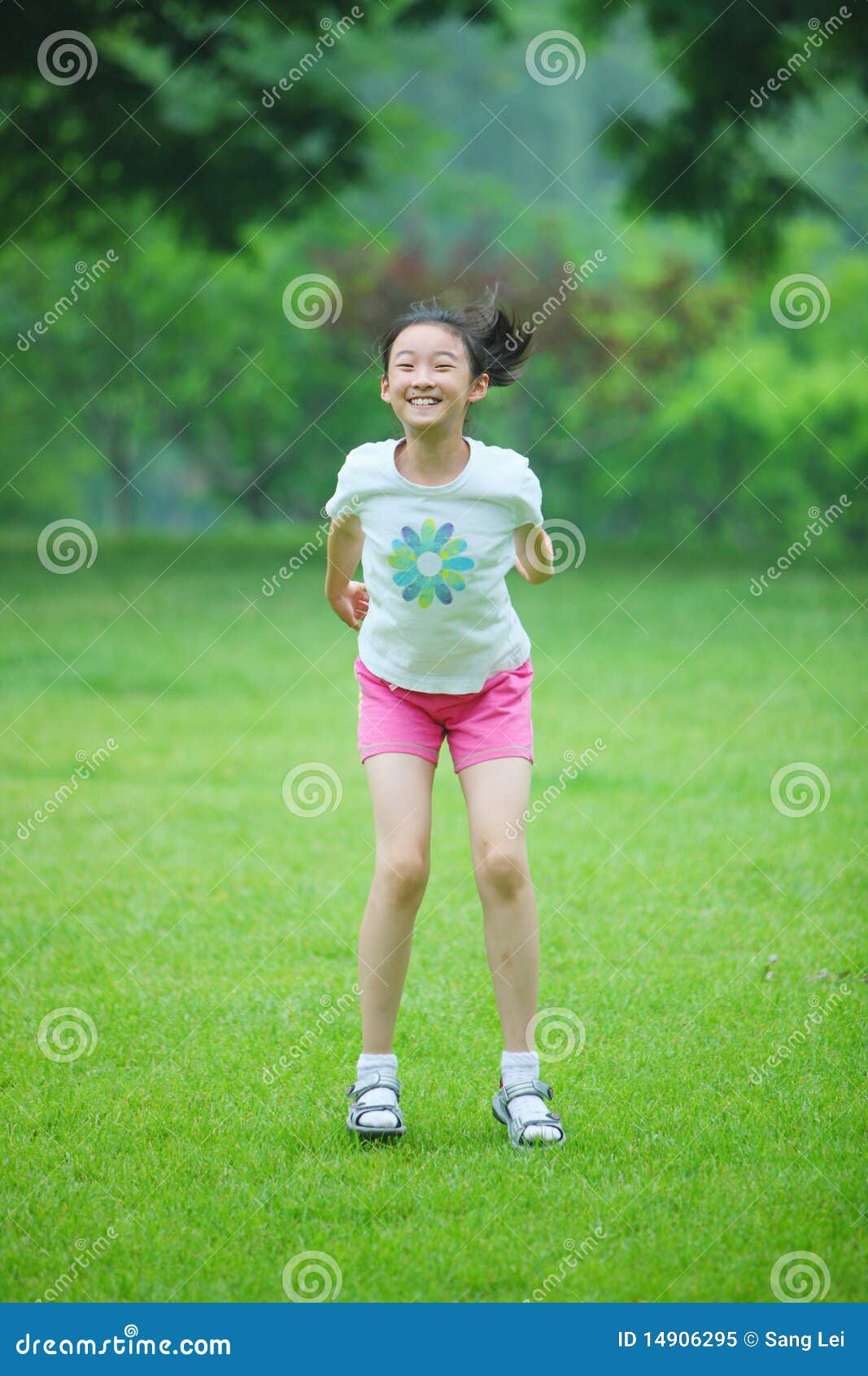 Chinese girl jump on lawn stock image. Image of beauty - 14906295