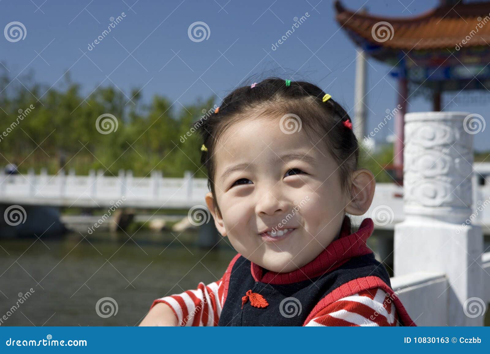 Chinese girl with smile stock image. Image of black, cradle - 10830163