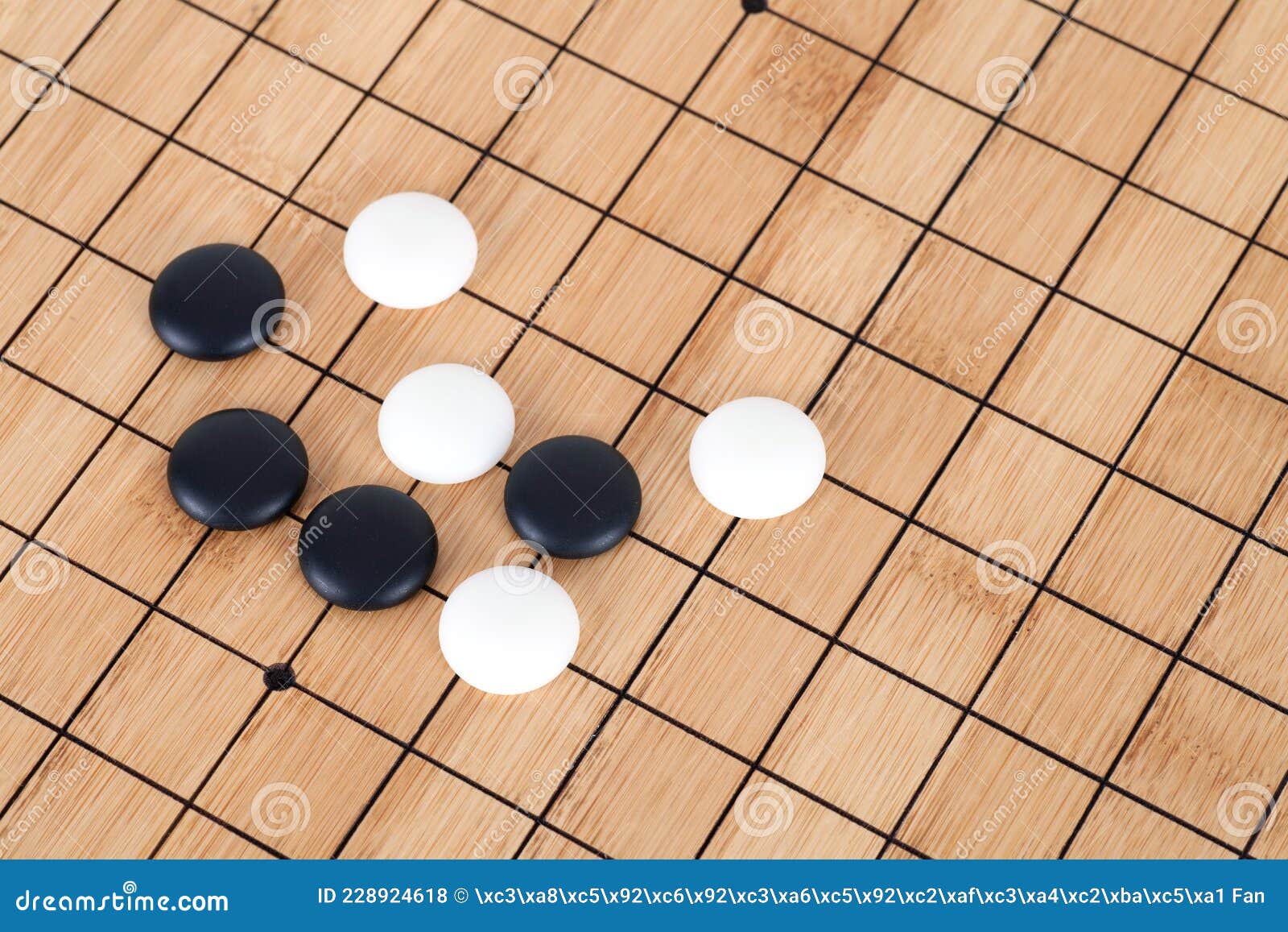Chinese Go Game on board stock photo. Image of move - 228924618