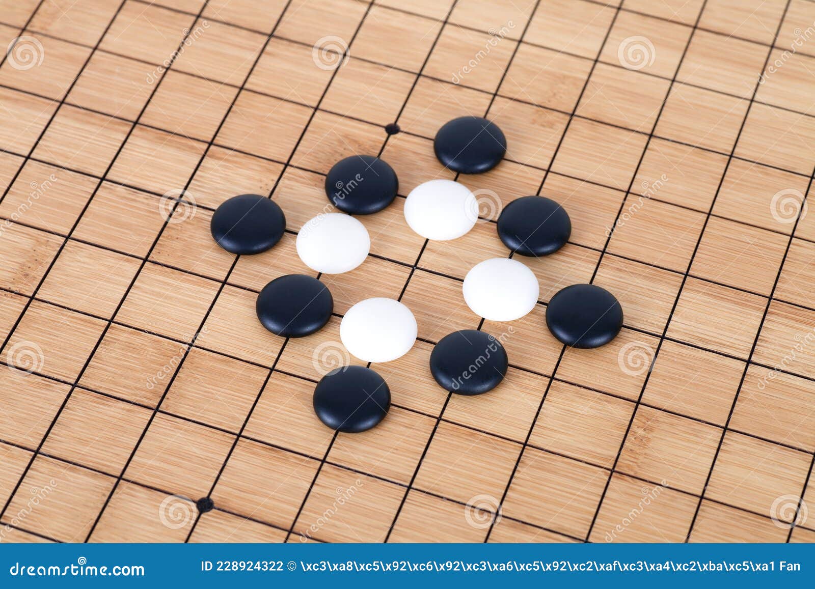 Chinese Go Game on table stock photo. Image of looking - 228924322
