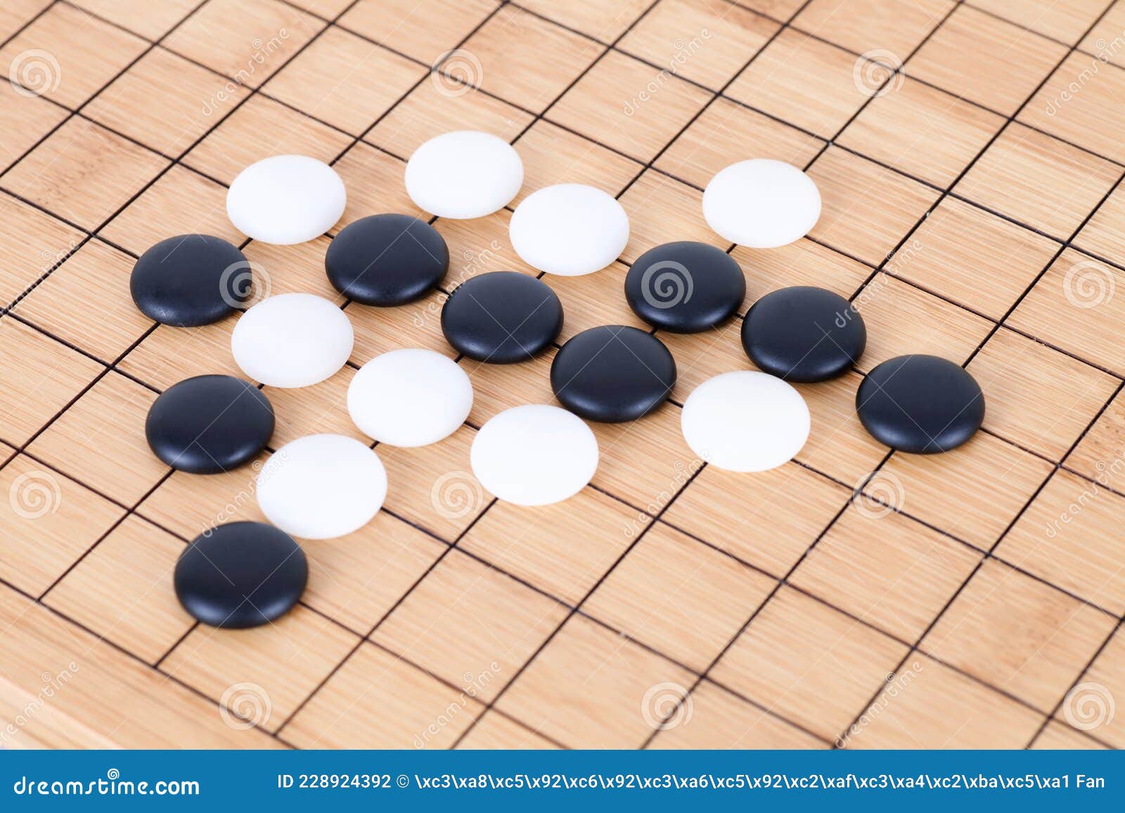 Chinese Go Game on table stock photo. Image of looking - 228924392