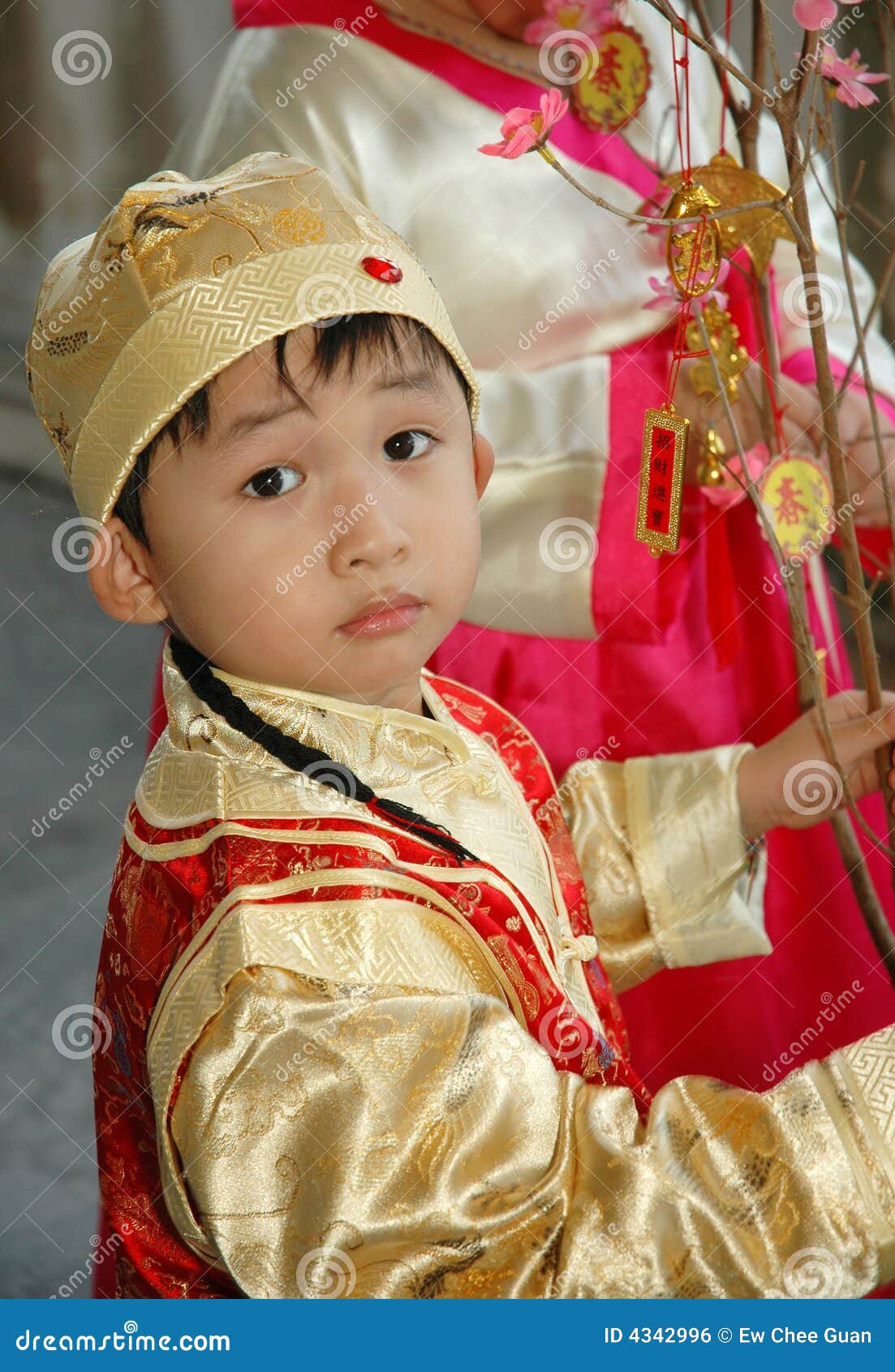 Chinese kid stock photo. Image of costume, china, golden - 4342996
