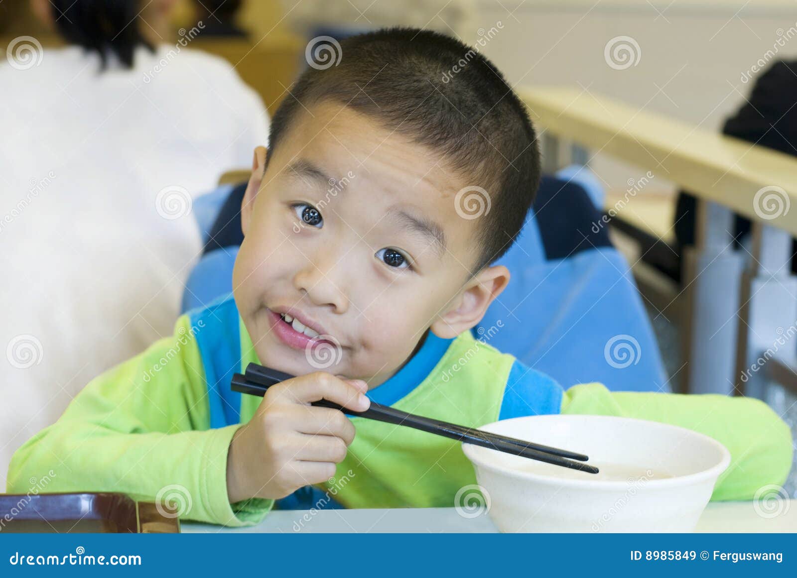 A Chinese Kid Have Breakfast Stock Image - Image of childhood, student ...