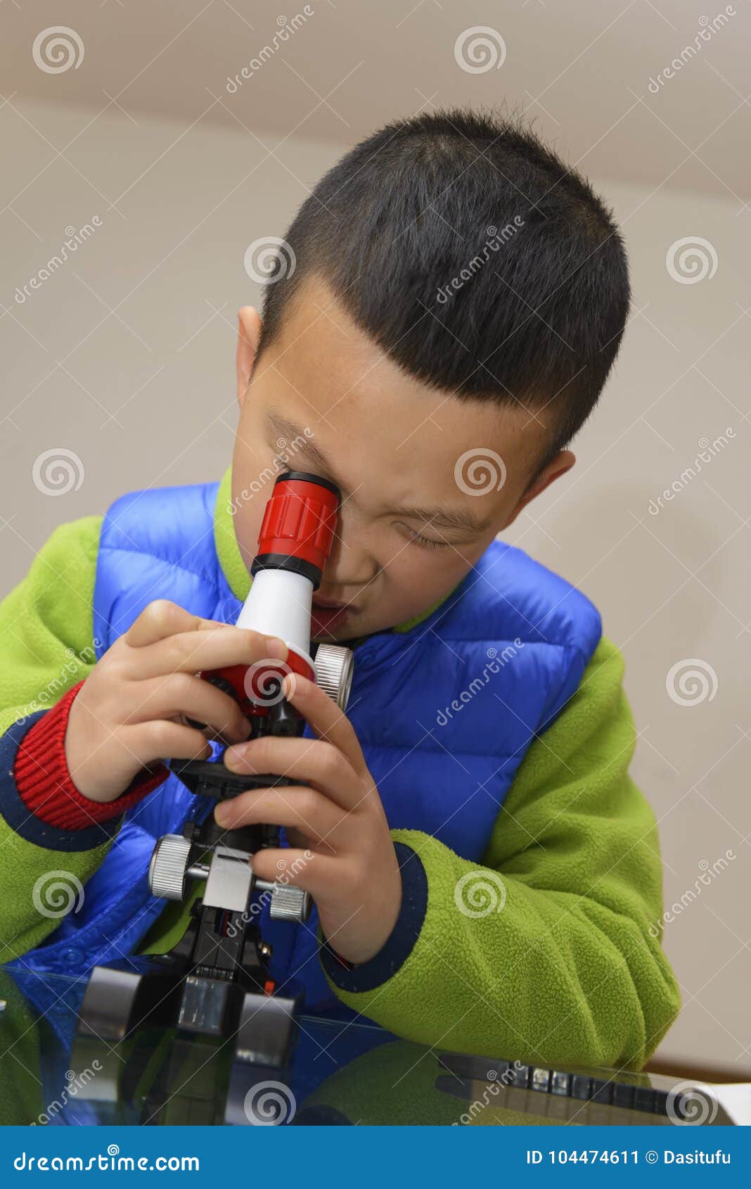 Kid using microscope stock image. Image of playful, professional ...