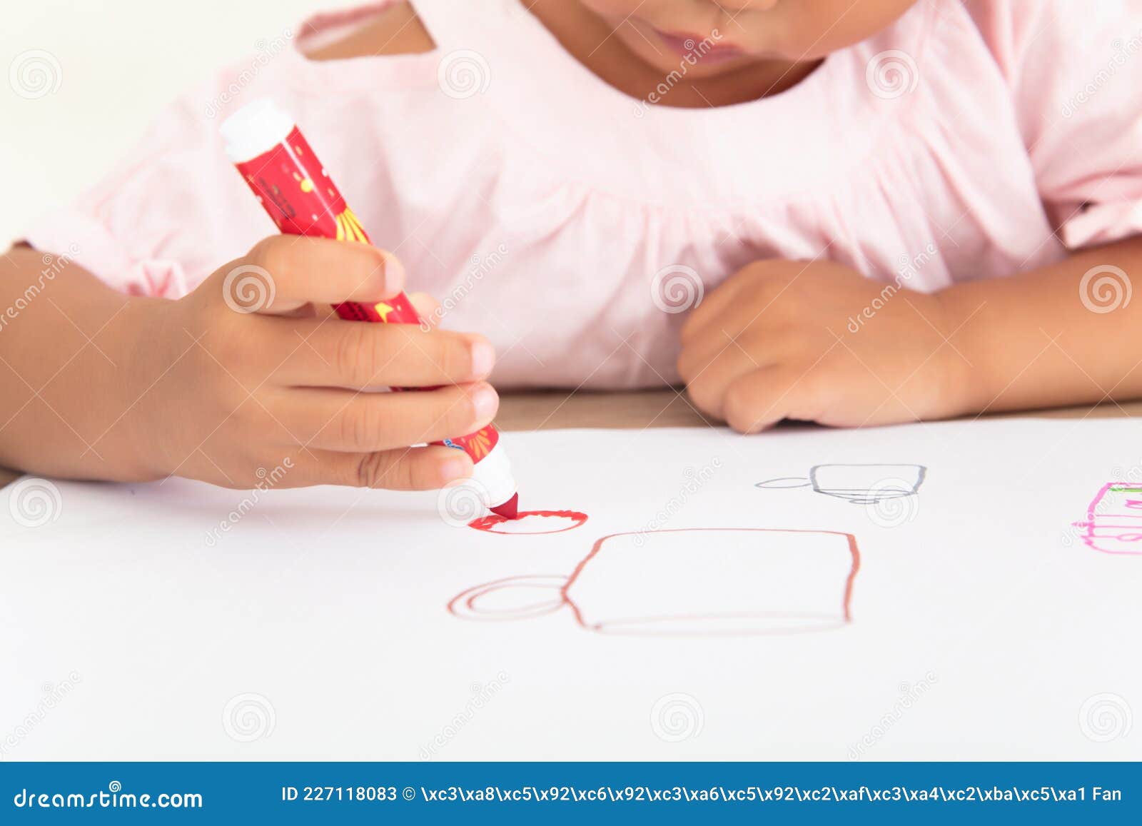 Chinese Kids Lie on the Table and Draw Seriously Stock Image - Image of ...