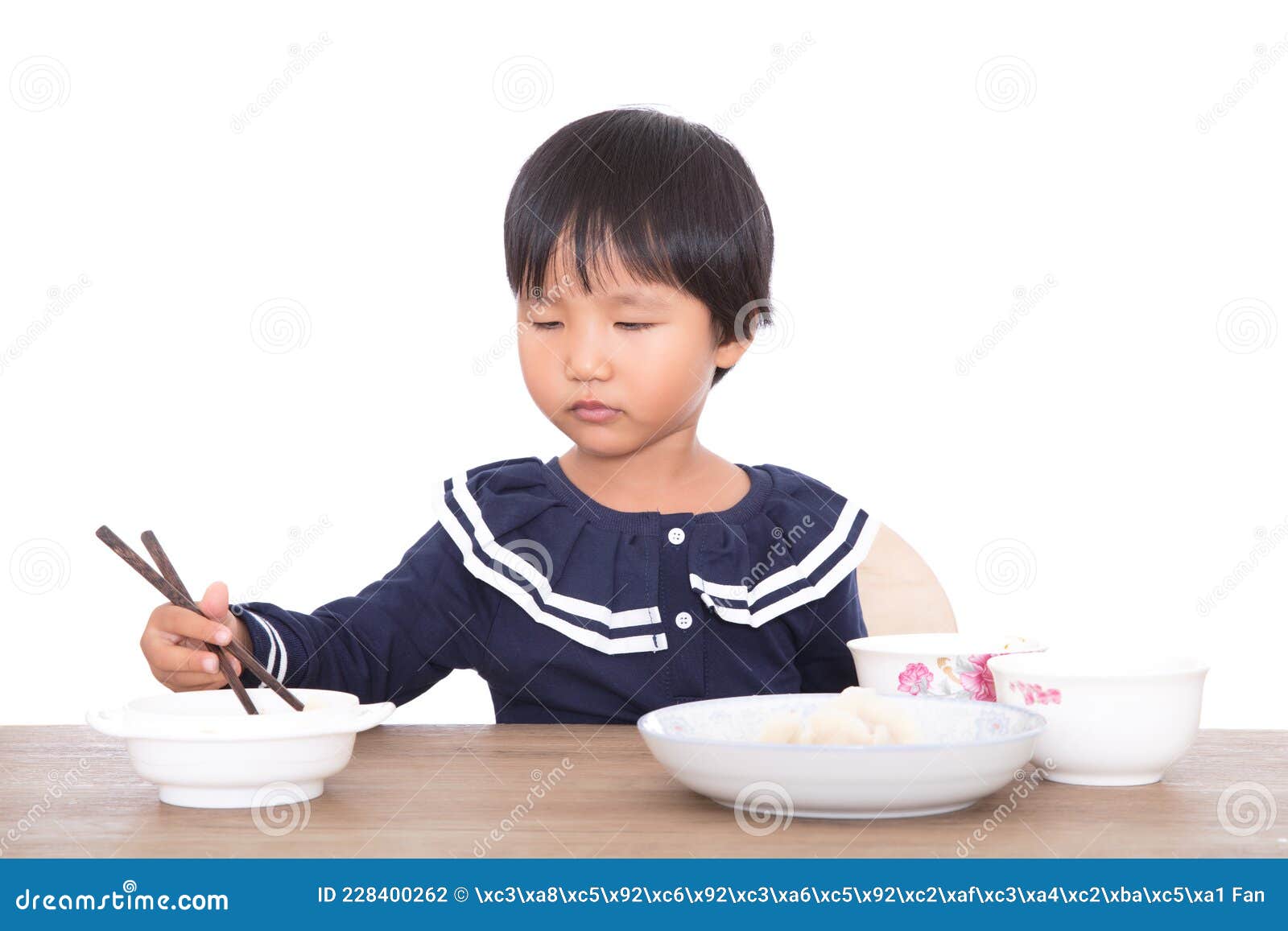 Chinese Little Girl Eating at the Table Stock Photo - Image of pile ...