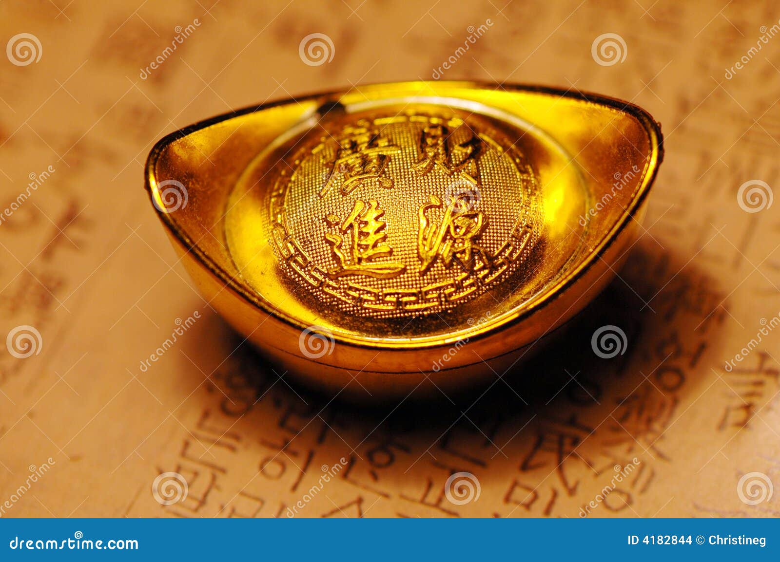 Chinese Lucky Gold Ingot on Calligraphy Backgr Stock Photo - Image of ...