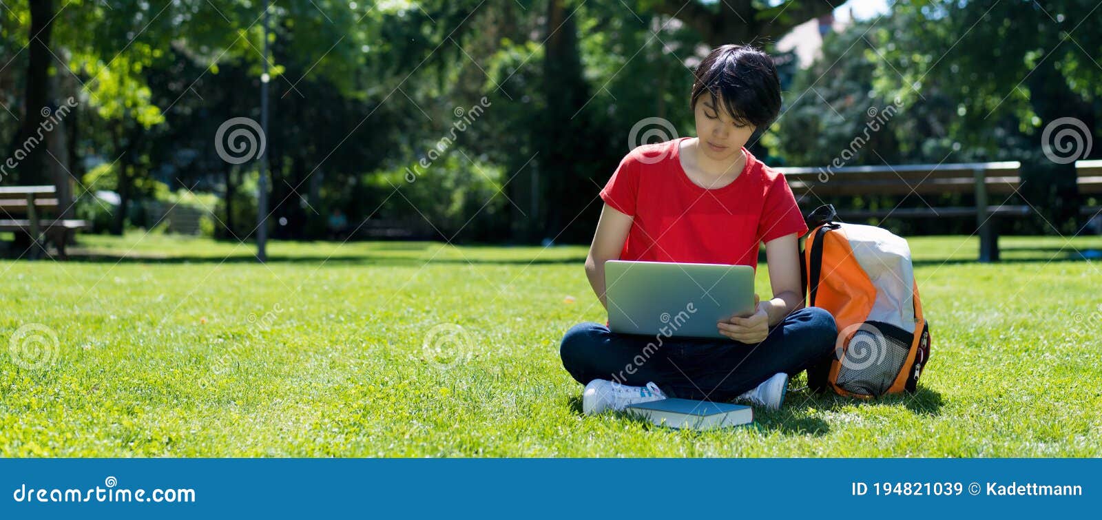 Chinese Male Student Learning at Computer at Campus of University Stock ...