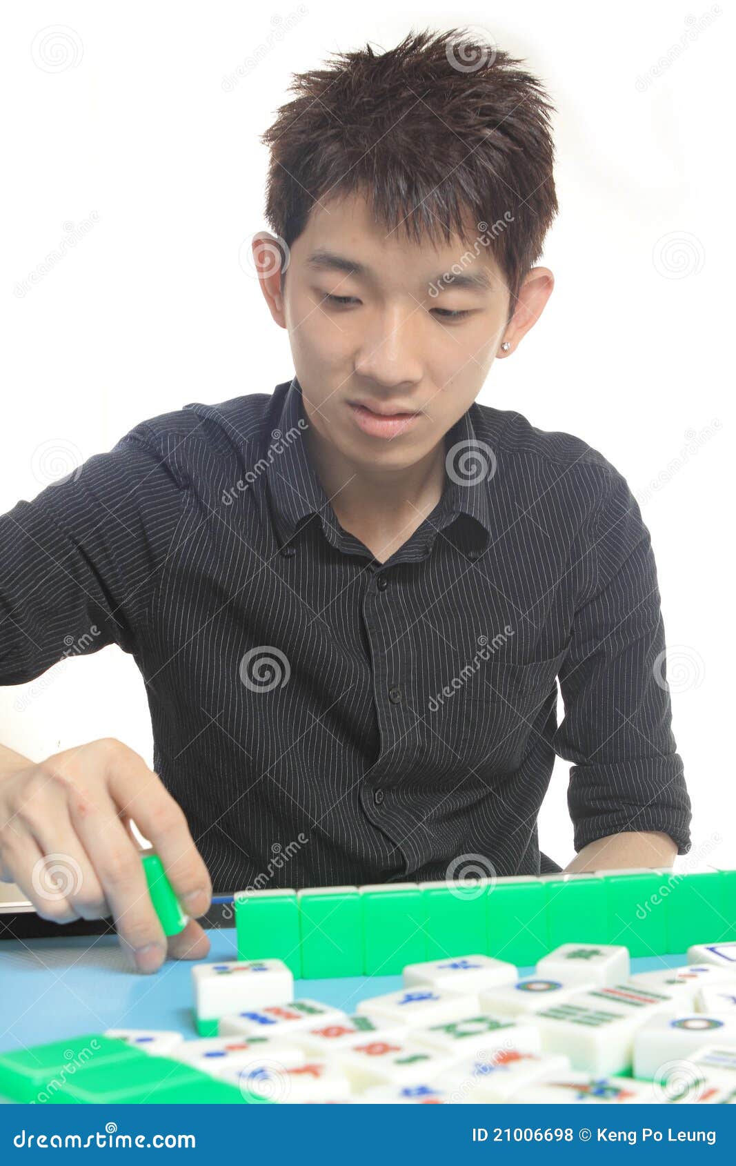 Chinese man play Mahjong stock photo. Image of desk, loser - 21006698