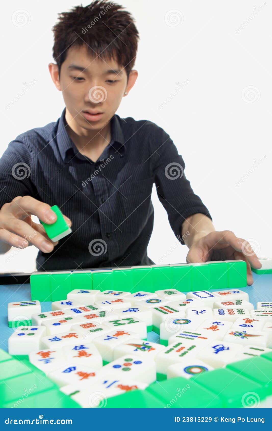 Chinese man play Mahjong stock image. Image of object - 23813229