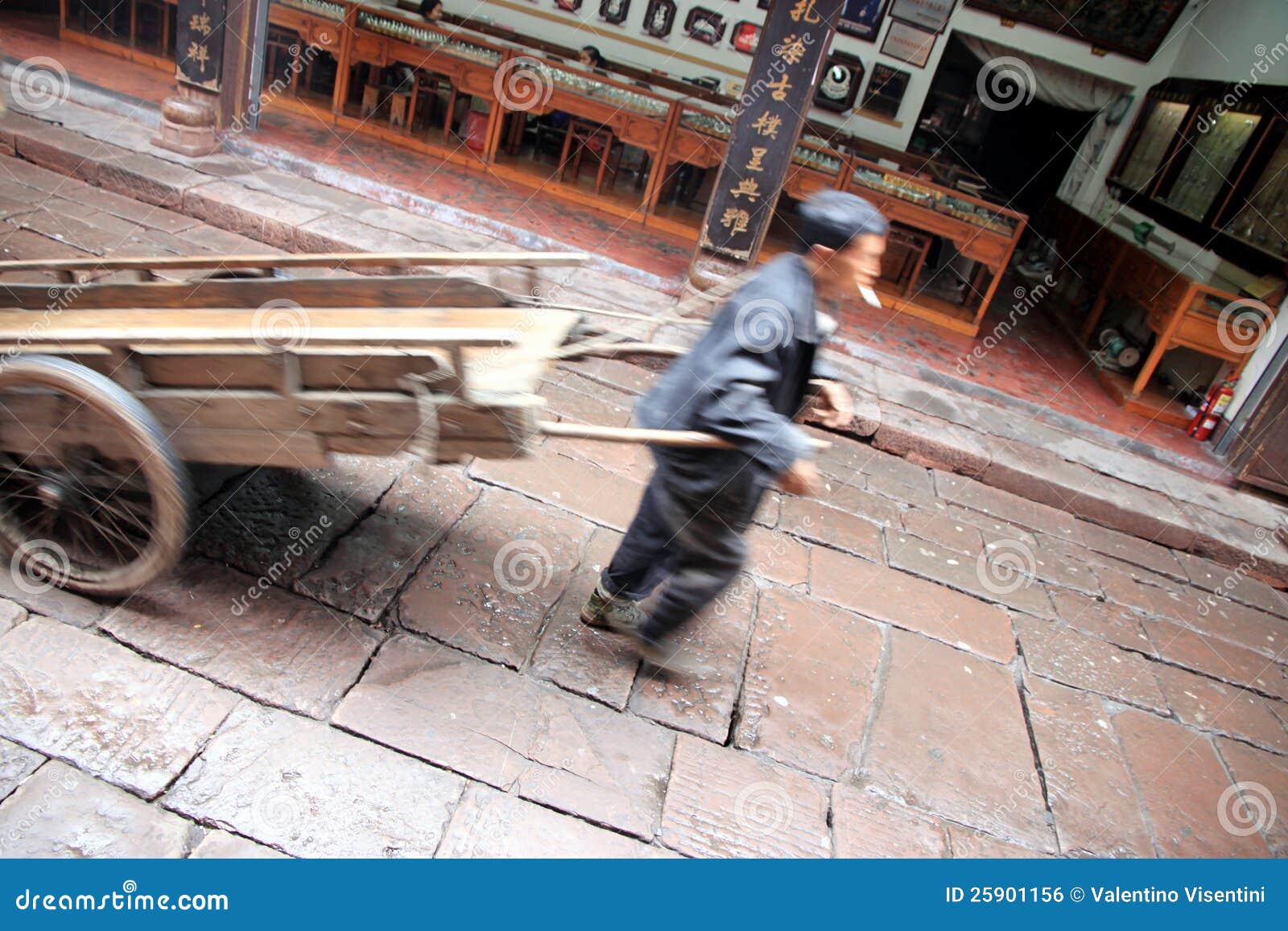 Chinese Man Pulling Cart editorial photo. Image of move - 25901156