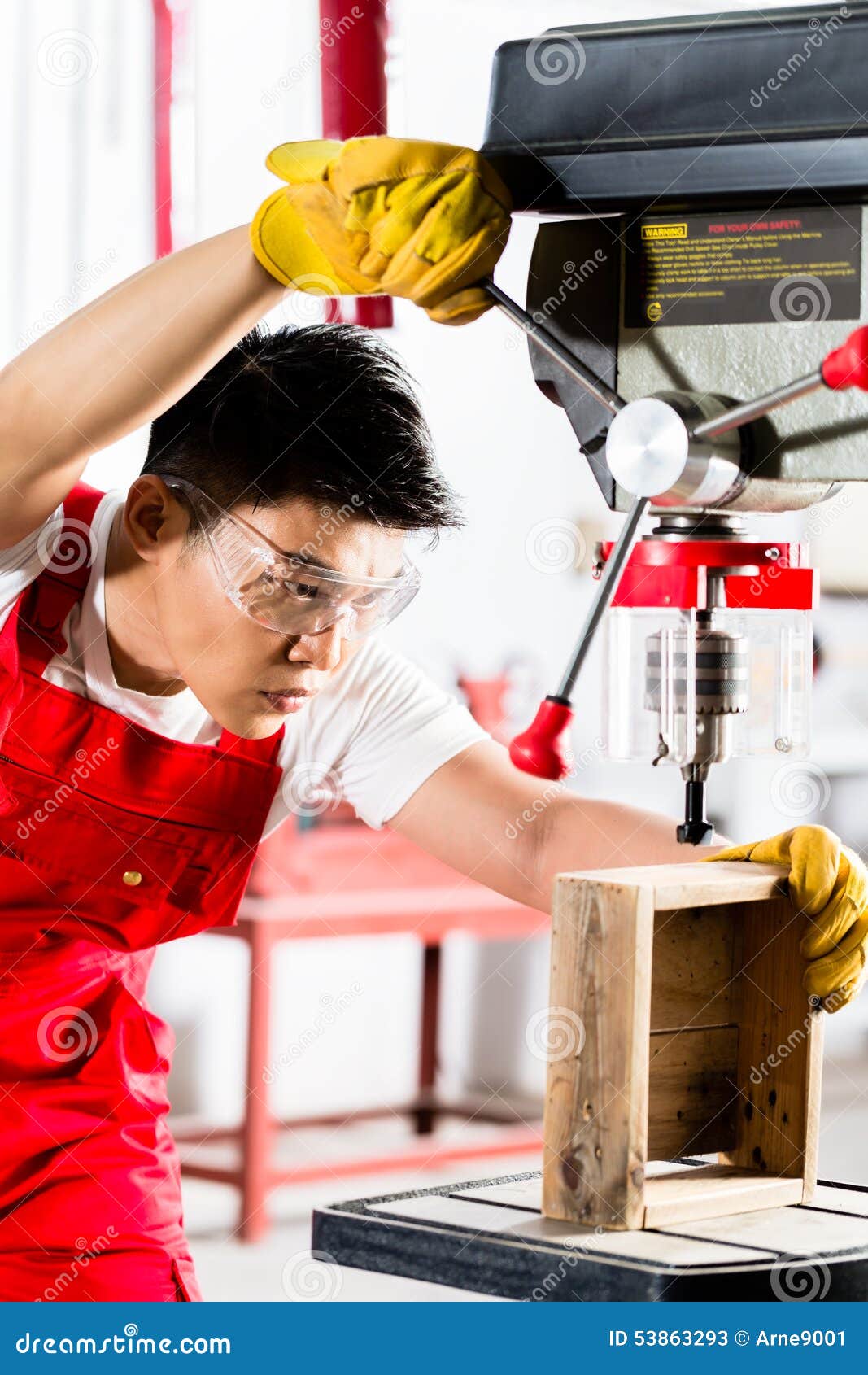 Chinese Man Working with Drill in Factory Stock Image - Image of ...