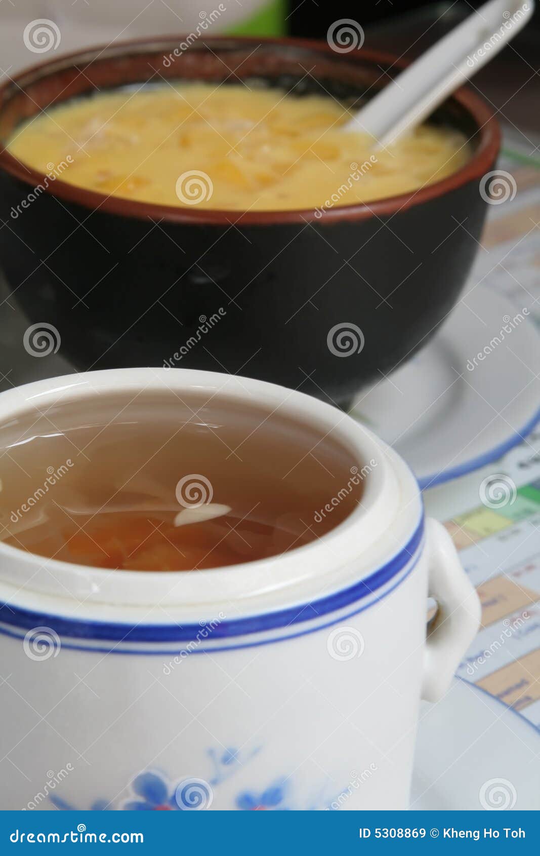 Chinese Medicinal Herbal Soup and Mango Sago Desse Stock Image - Image ...
