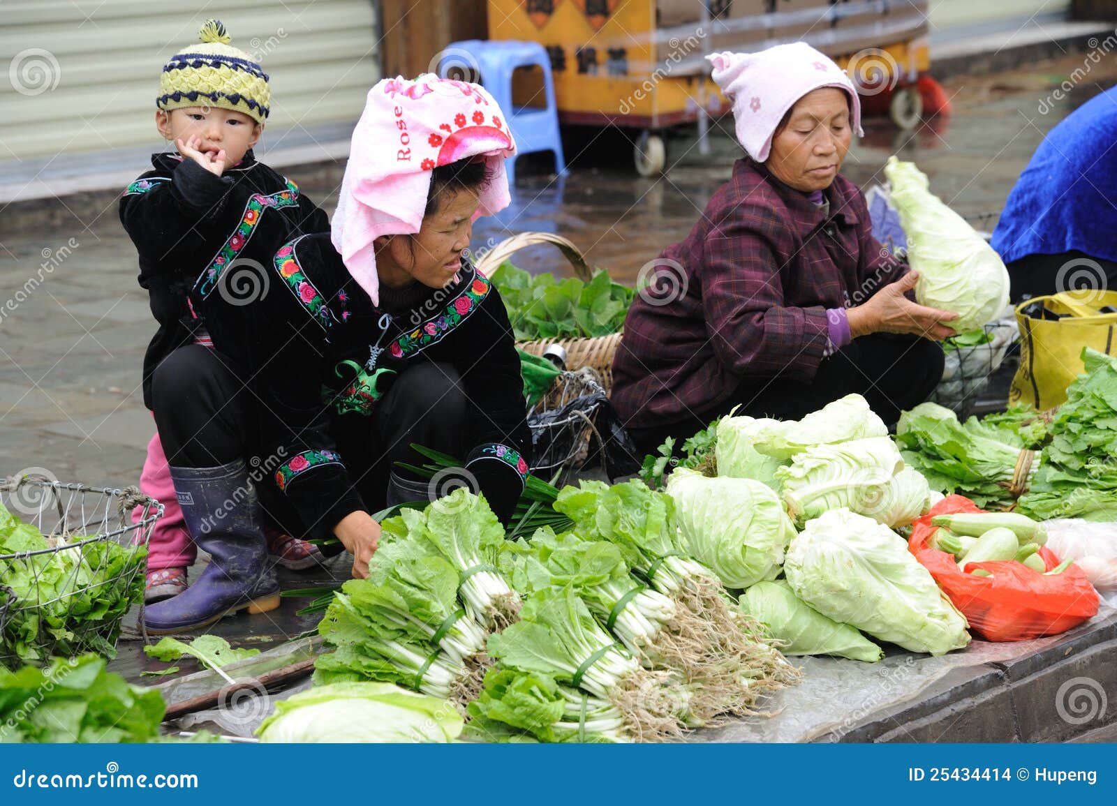 The Chinese Miao Women And Kids Wearing Traditional Clothes And Dancing ...