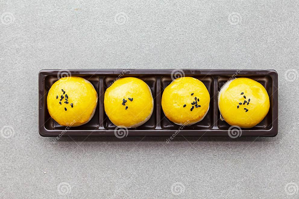 Pastry Moon Cake in a Black Plastic Package Placed on the Table Stock ...