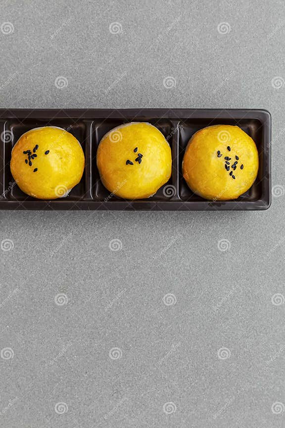 Pastry Moon Cake in a Black Plastic Package Placed on the Table Stock ...
