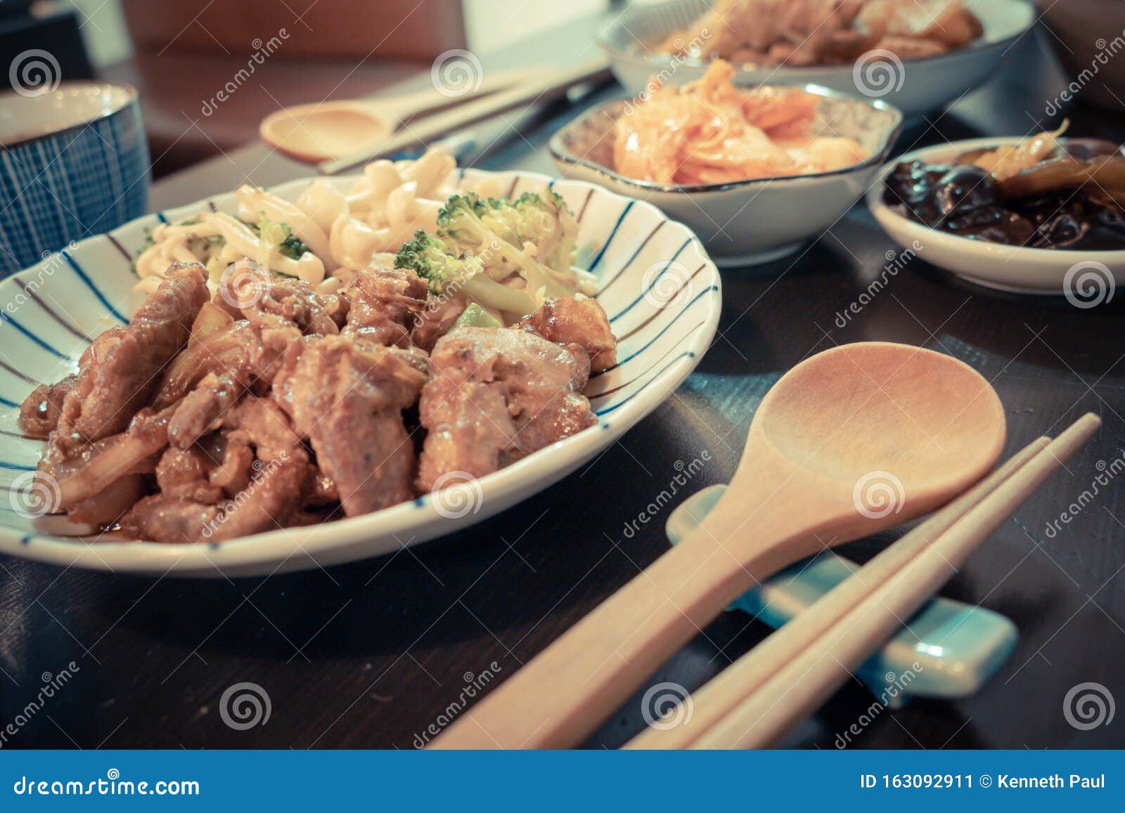 Chinese Pork Dish on Table with Side Dishes Stock Image - Image of ...
