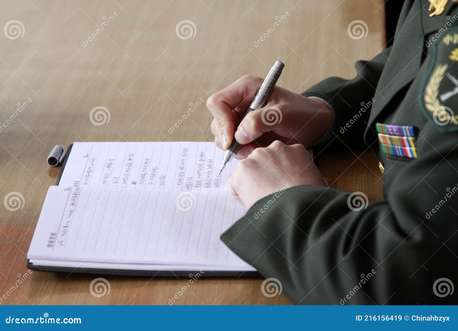 Chinese Soldier Hand Taking Notes Stock Image - Image of notebook, flag ...