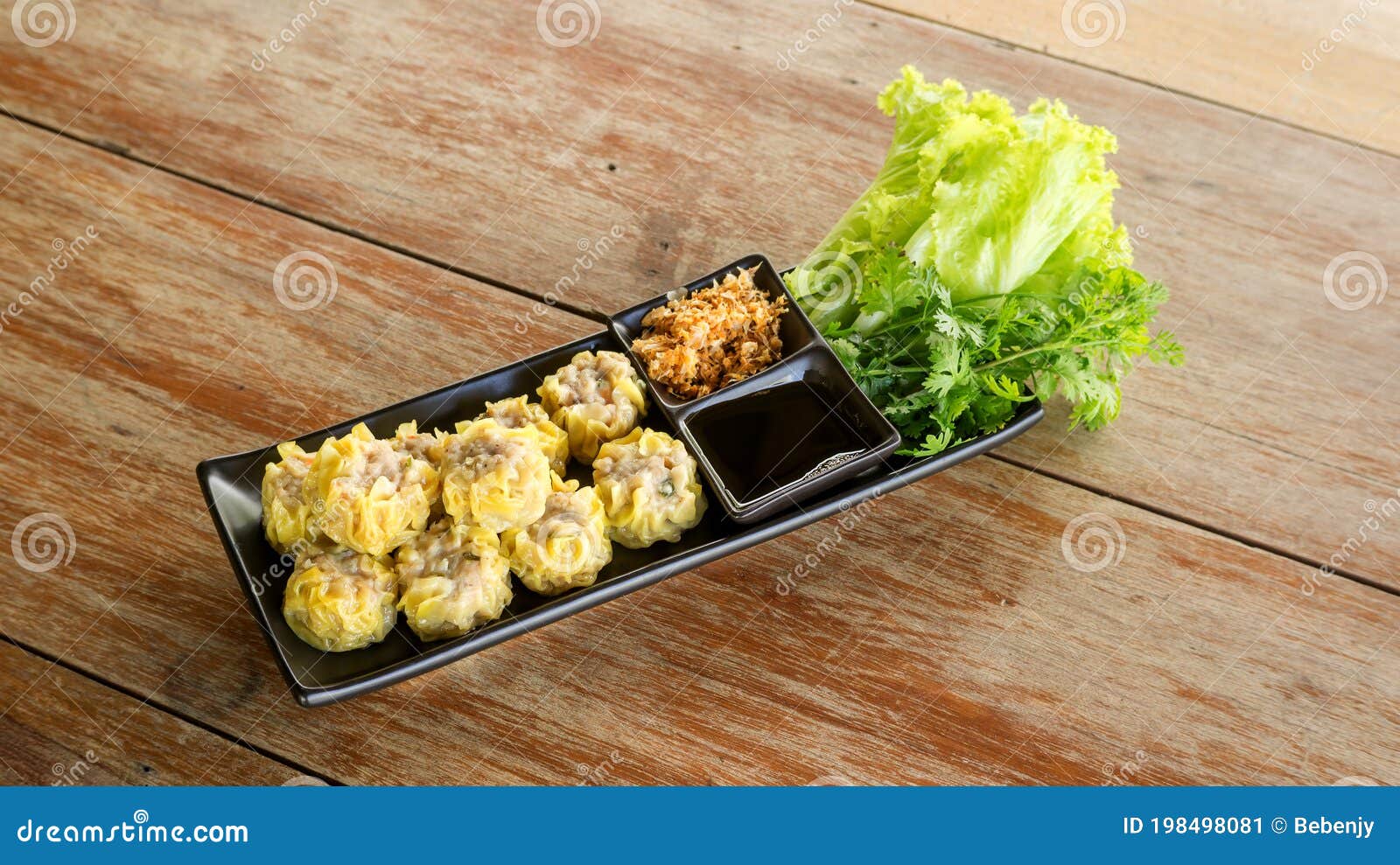 Chinese Steamed Dumpling on a Black Plate Stock Image - Image of meat ...