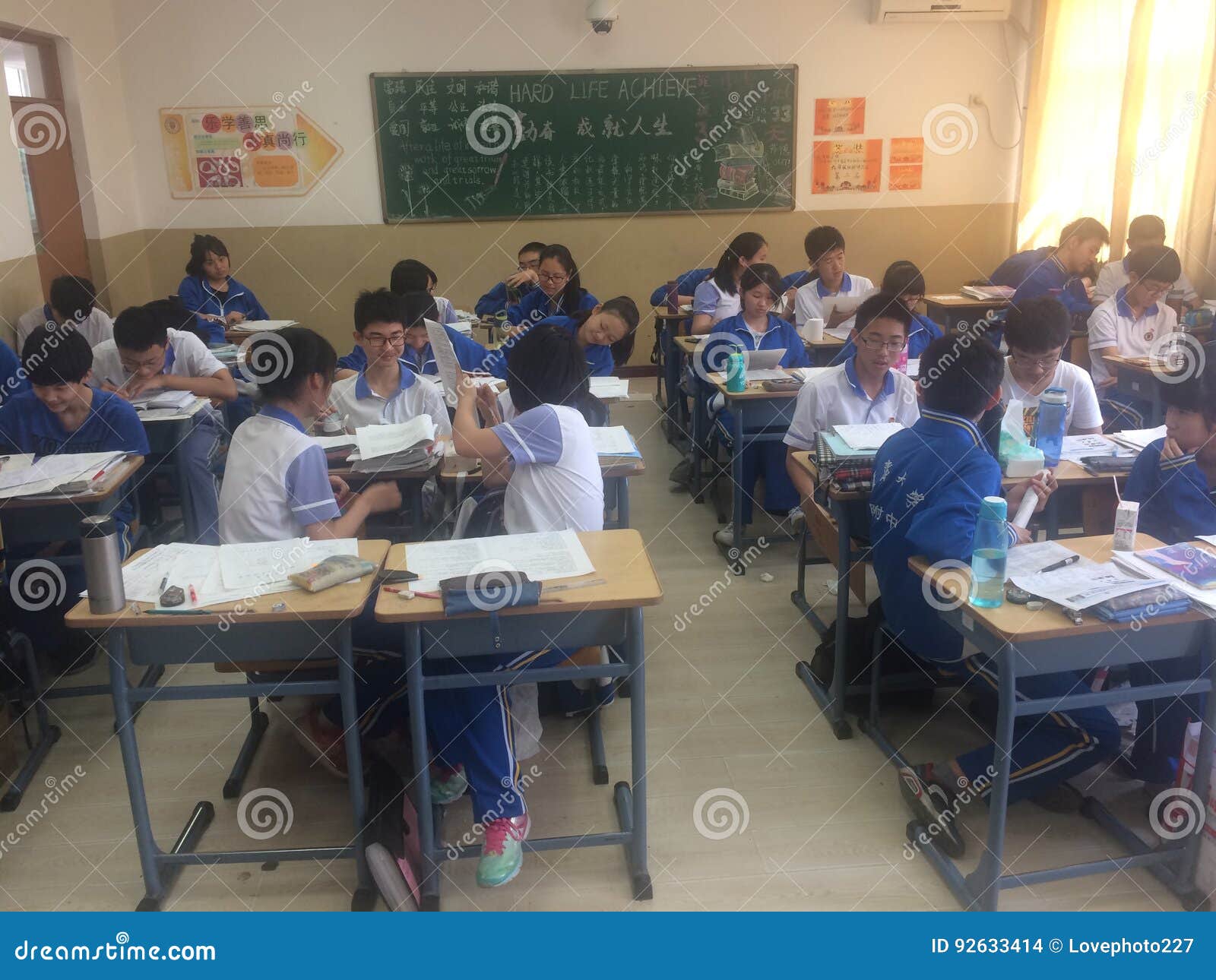 Chinese students editorial stock image. Image of desks - 92633414