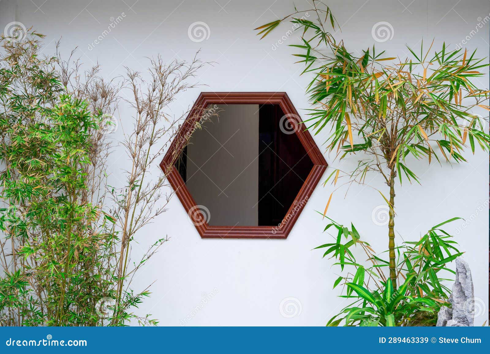 Chinese Style Bamboo Garden Hexagonal Window Design Stock Image - Image ...
