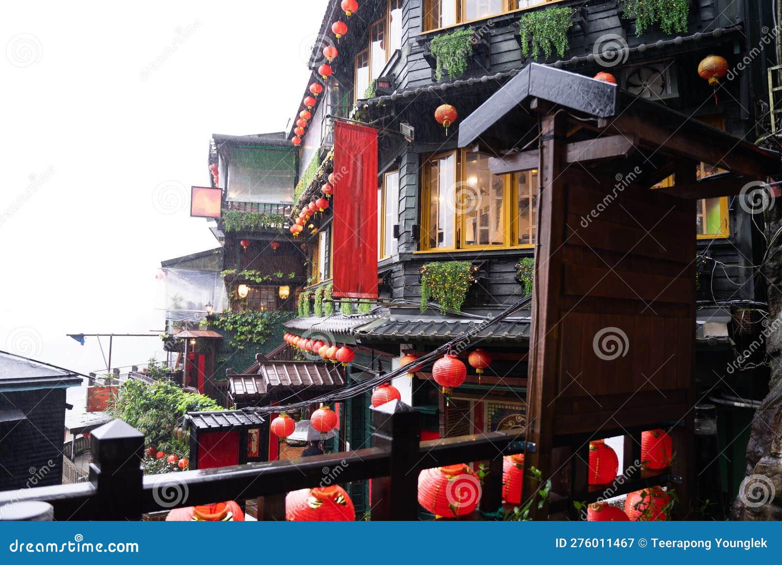 Chinese Style Cafe Decorated with Red Lanterns, the Sky is Cloudy and ...