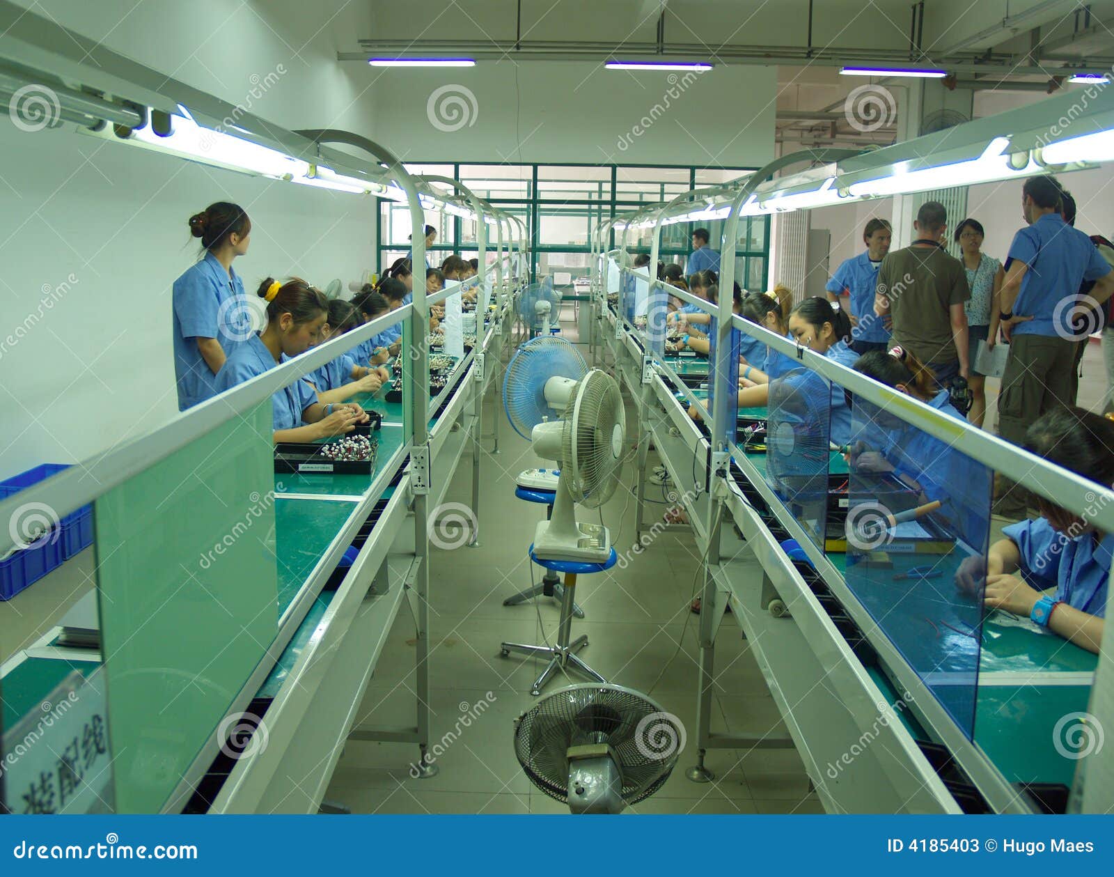 Chinese sweatshop interior editorial stock photo. Image of people - 4185403