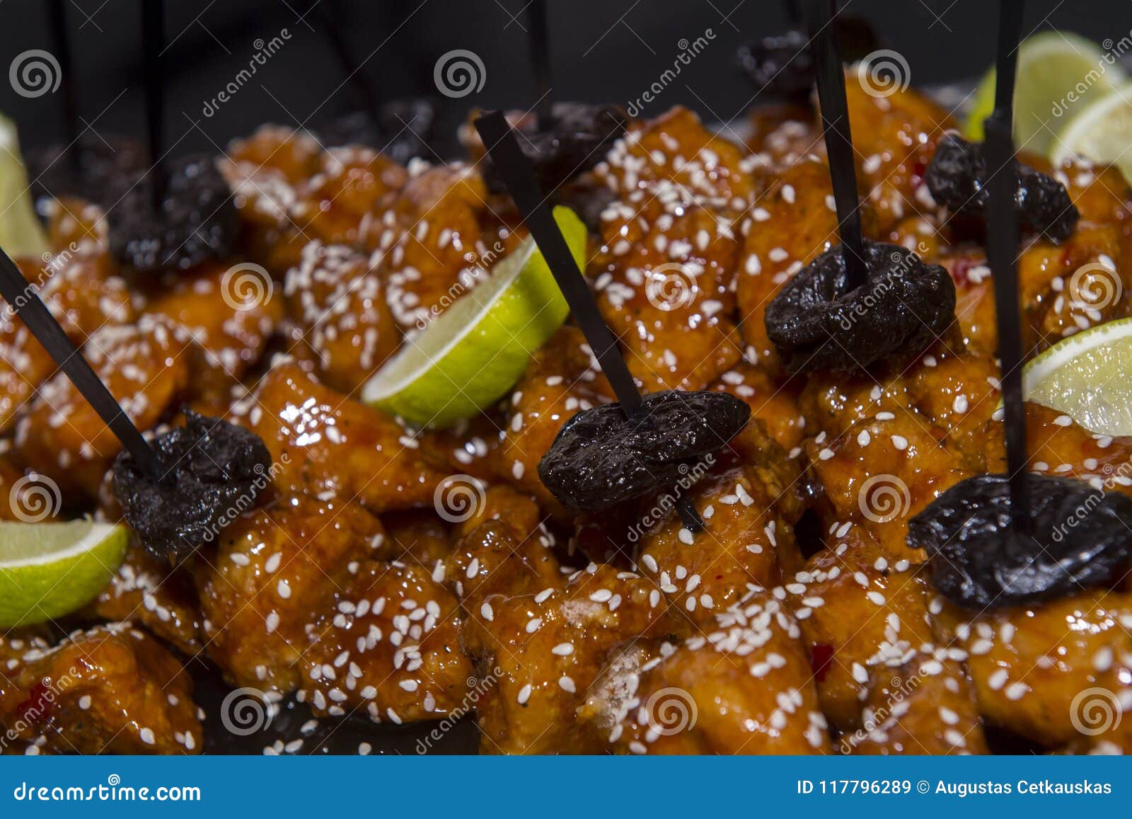 Chinese Sweet Sesame Chicken with Plums and Lemon Stock Image - Image ...