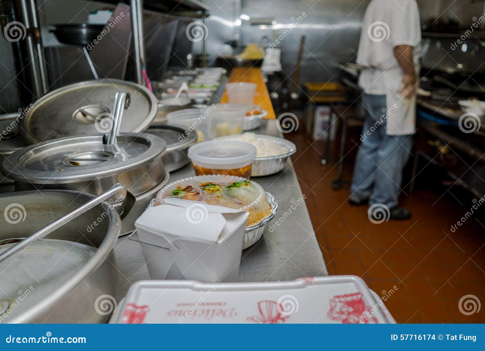 Chinese Take Out Orders on the Table with Background Chef Stock Photo ...