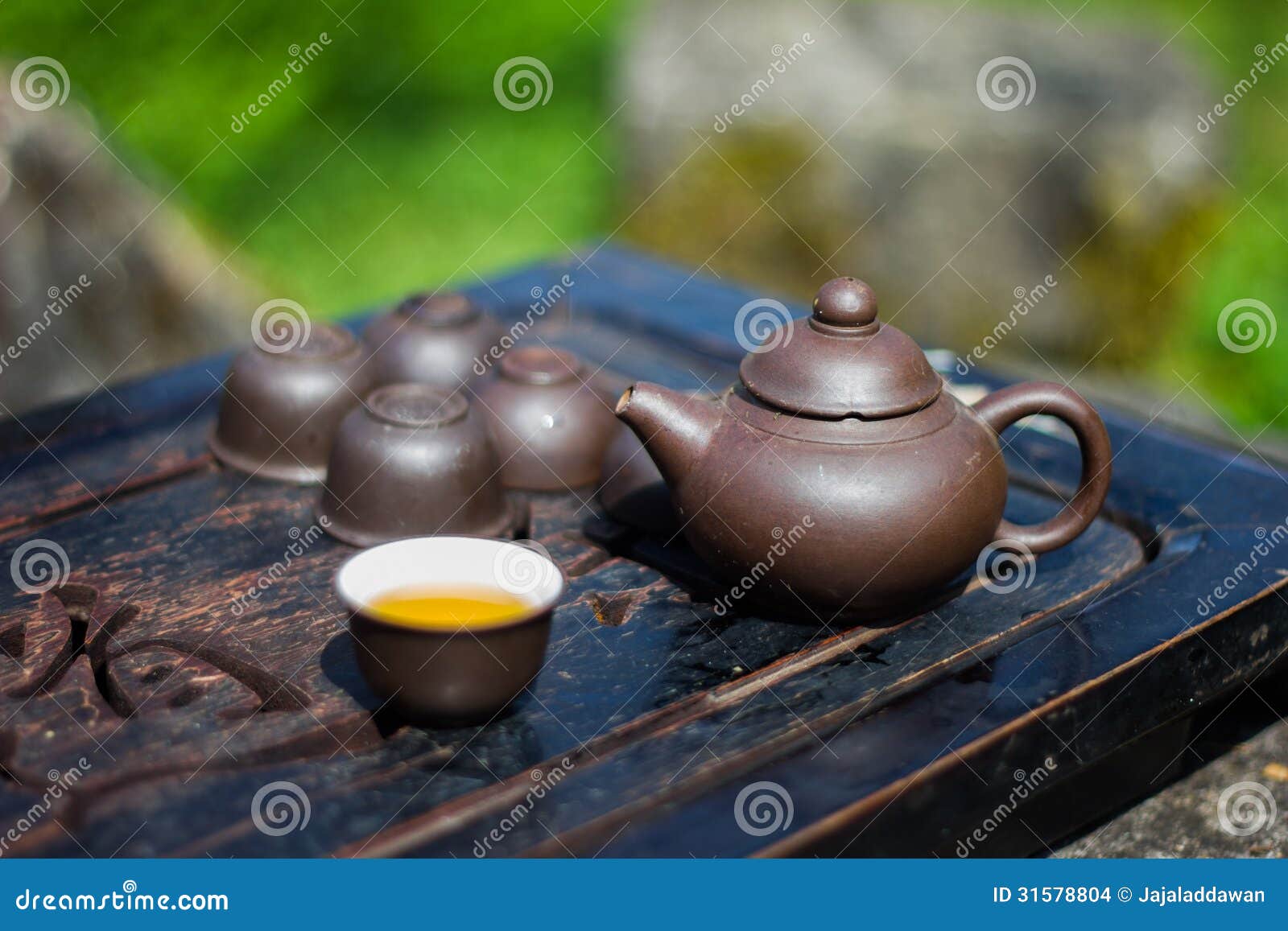 Chinese tea set in garden stock photo. Image of copy - 31578804