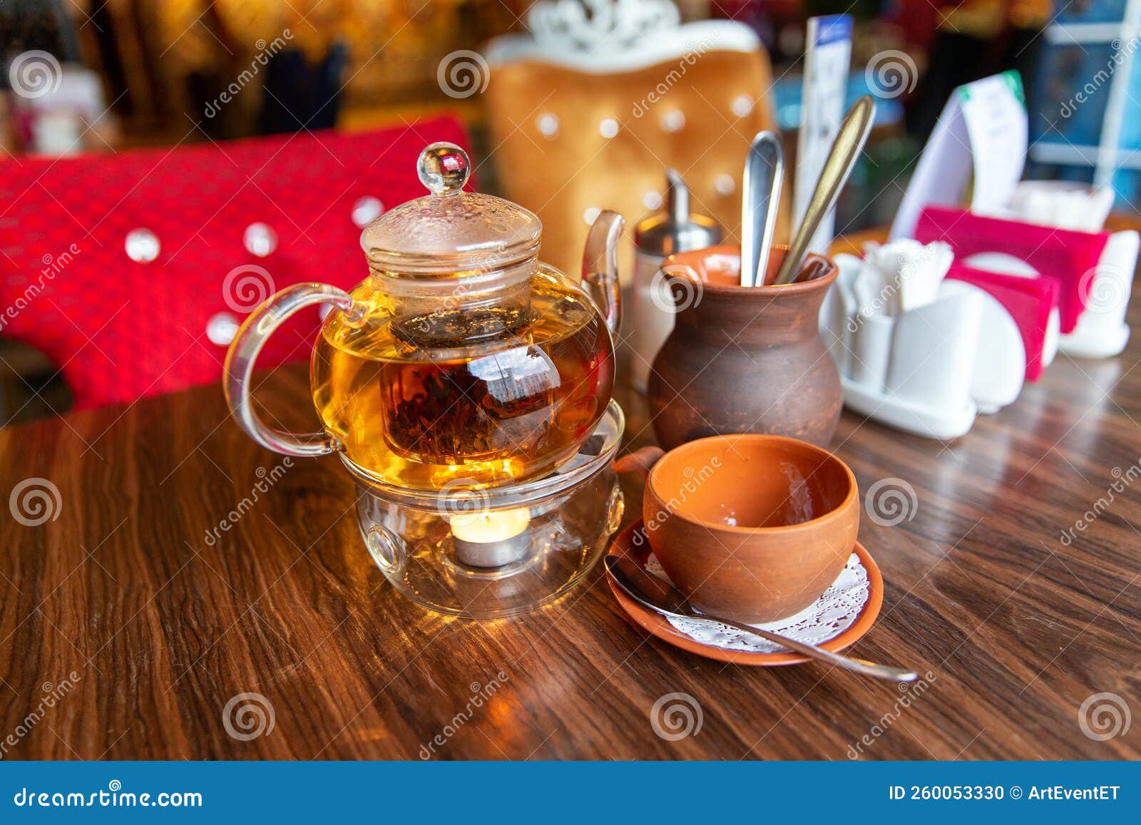 Chinese Teapot with Tea, on Burning Support from Glass Stock Photo ...