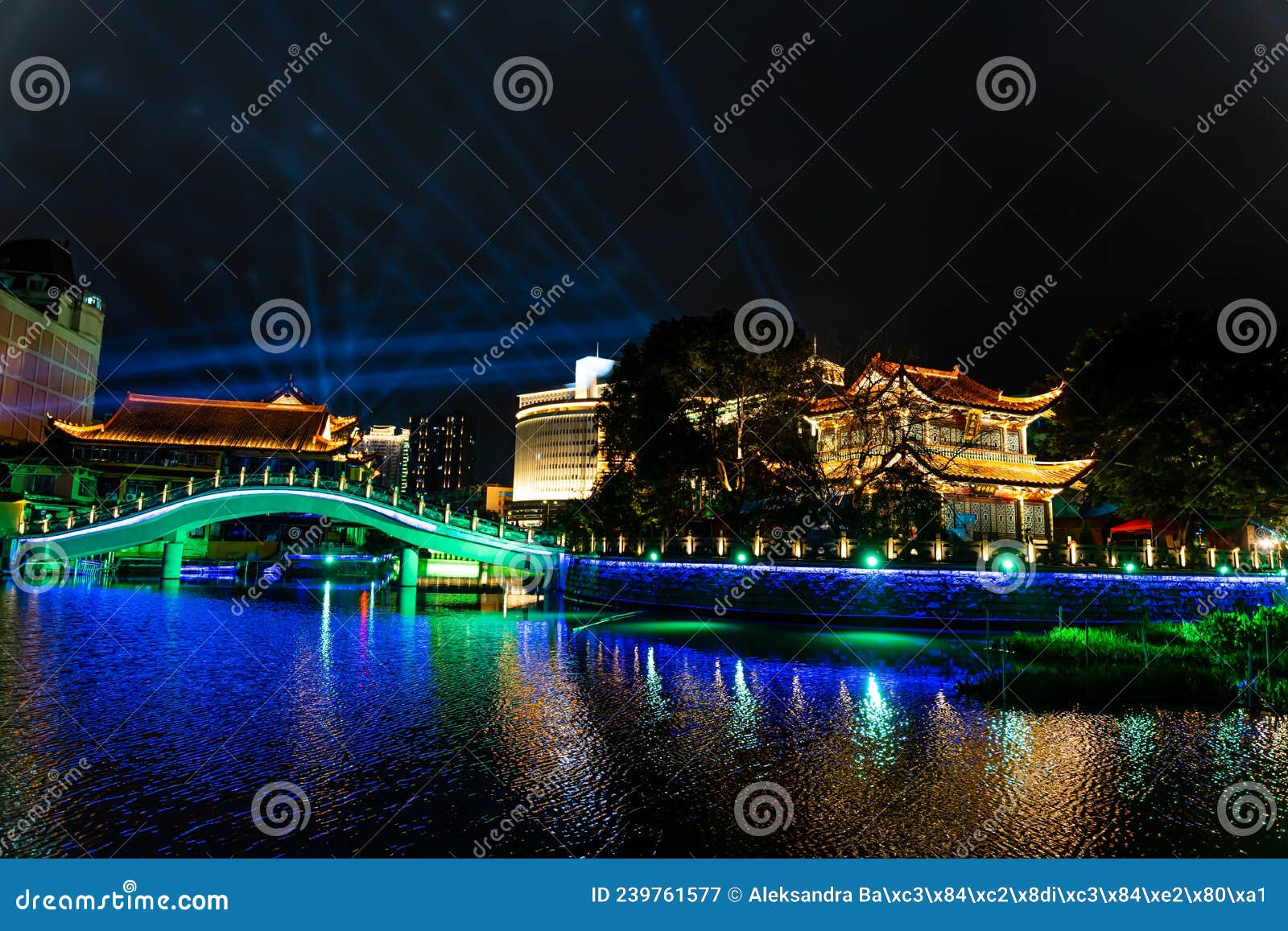 Chinese Traditional Temple and Bridge with Laser Show on the Sky Stock ...