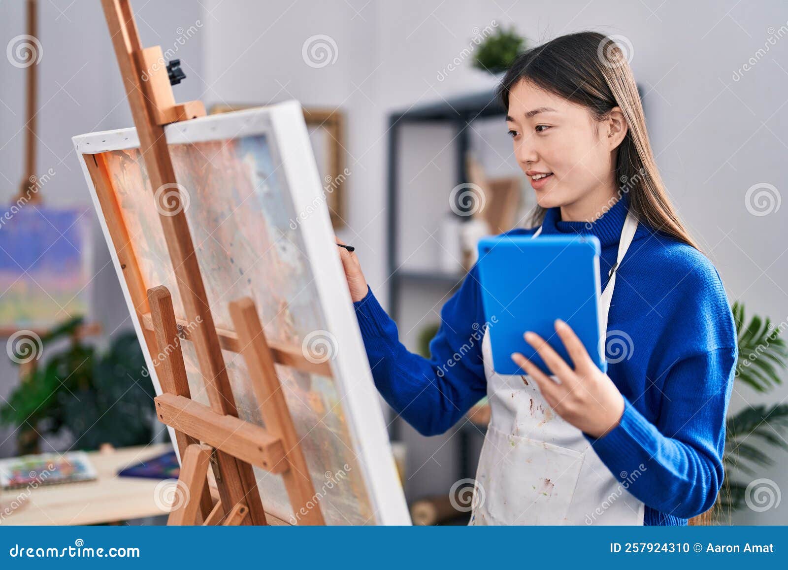 Chinese Woman Artist Using Touchpad Drawing at Art Studio Stock Photo ...