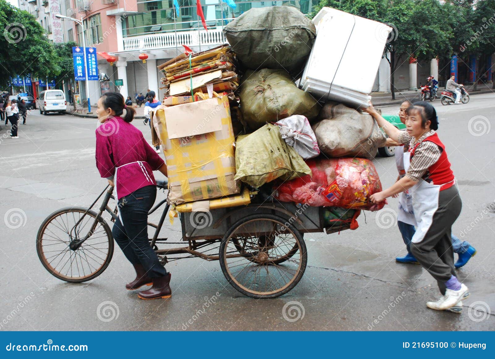 Chinese women carry goods editorial image. Image of lane - 21695100