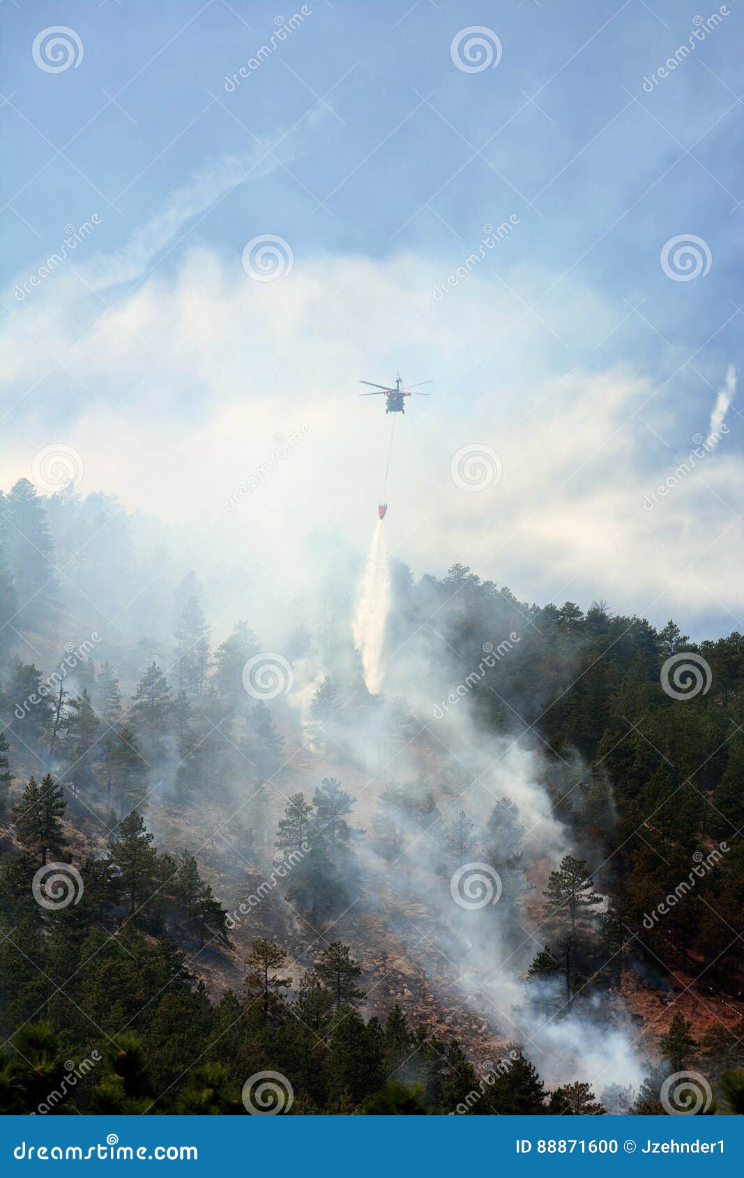 Firefighting Helicopter Dropping Water On Forest Fire Royalty-Free ...