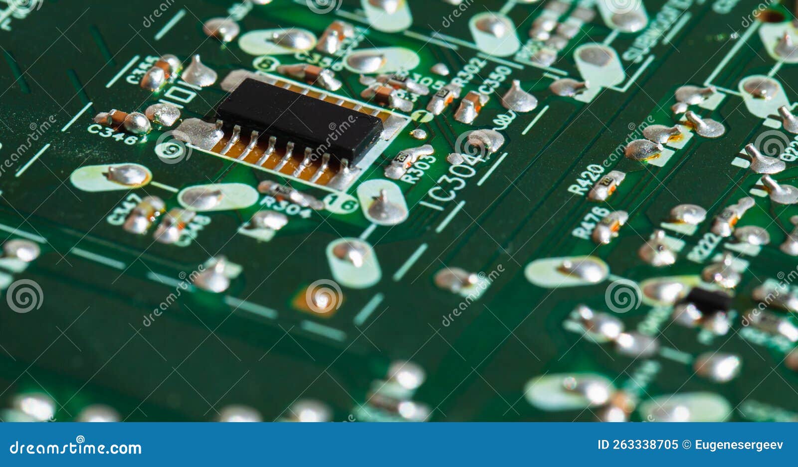 Chip and Capacitors Mounted on a Green Printed Circuit Board Stock ...