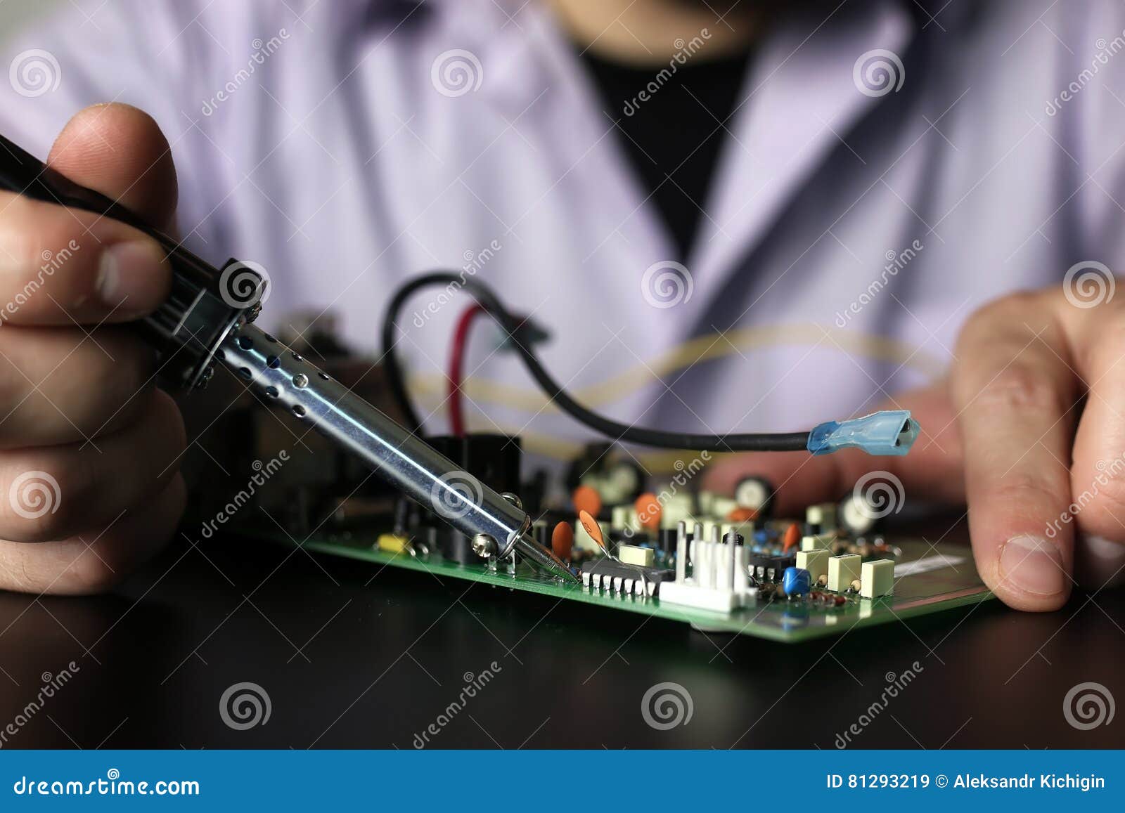 Chip soldering man hands stock image. Image of people - 81293219