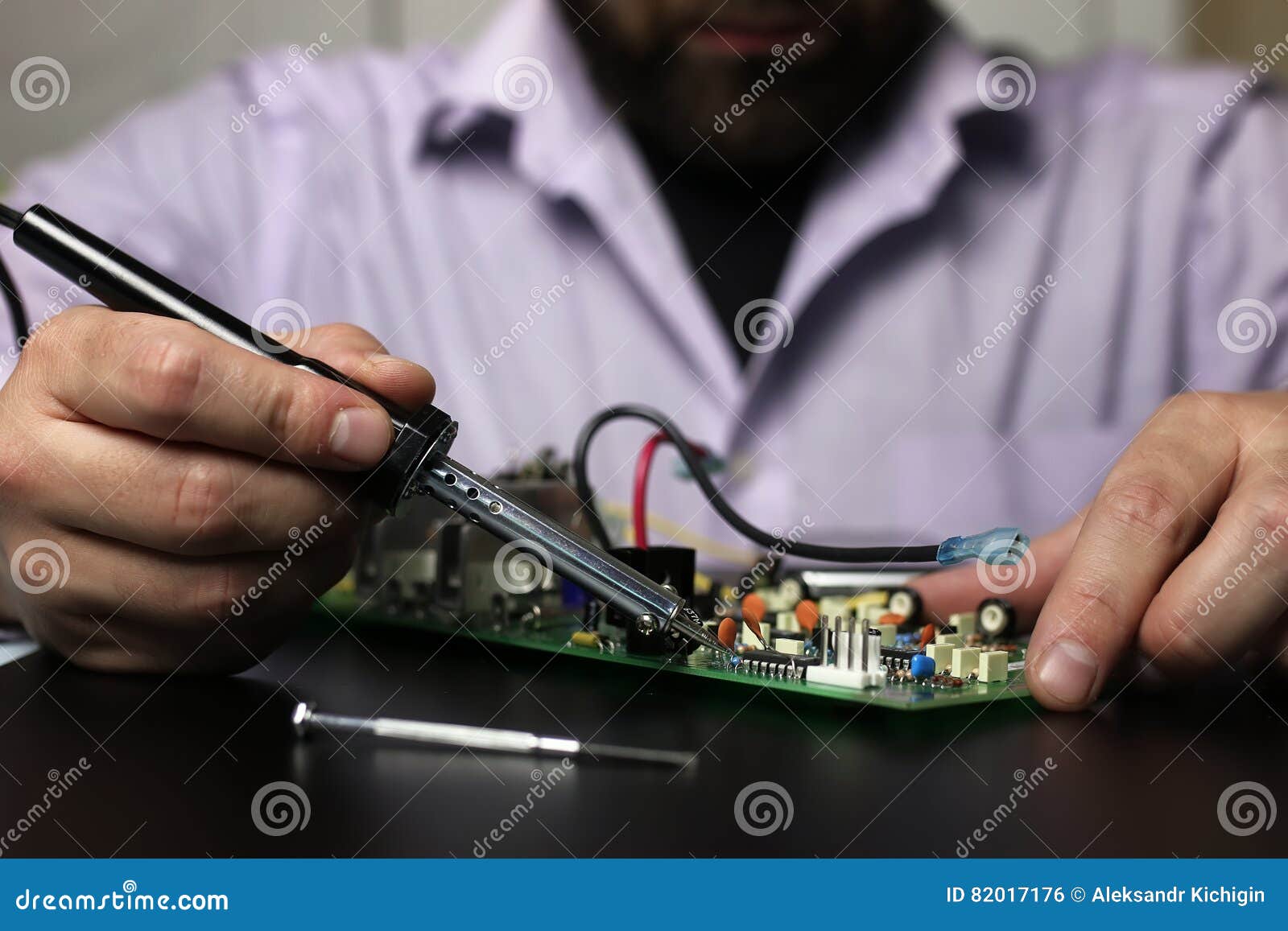 Chip soldering man hands stock photo. Image of hand, digital - 82017176