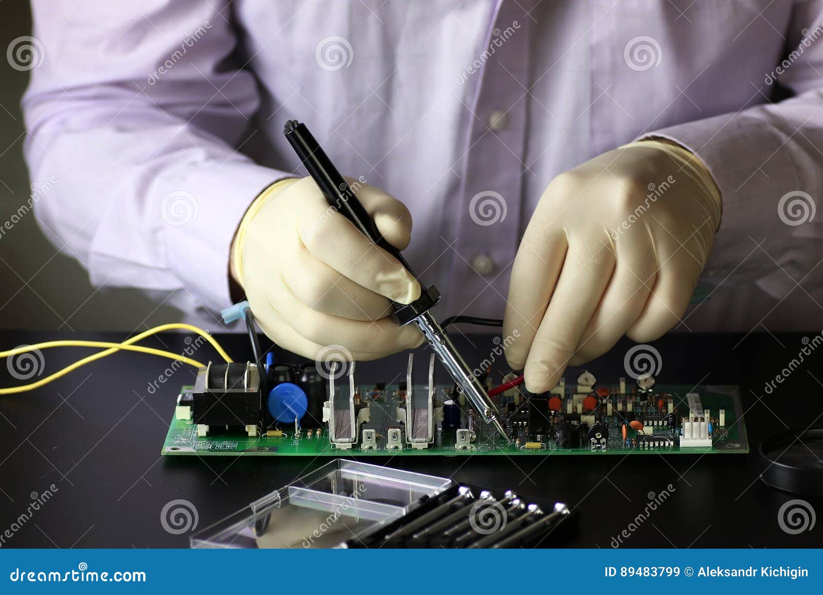 Chip soldering man hands stock image. Image of cable - 89483799