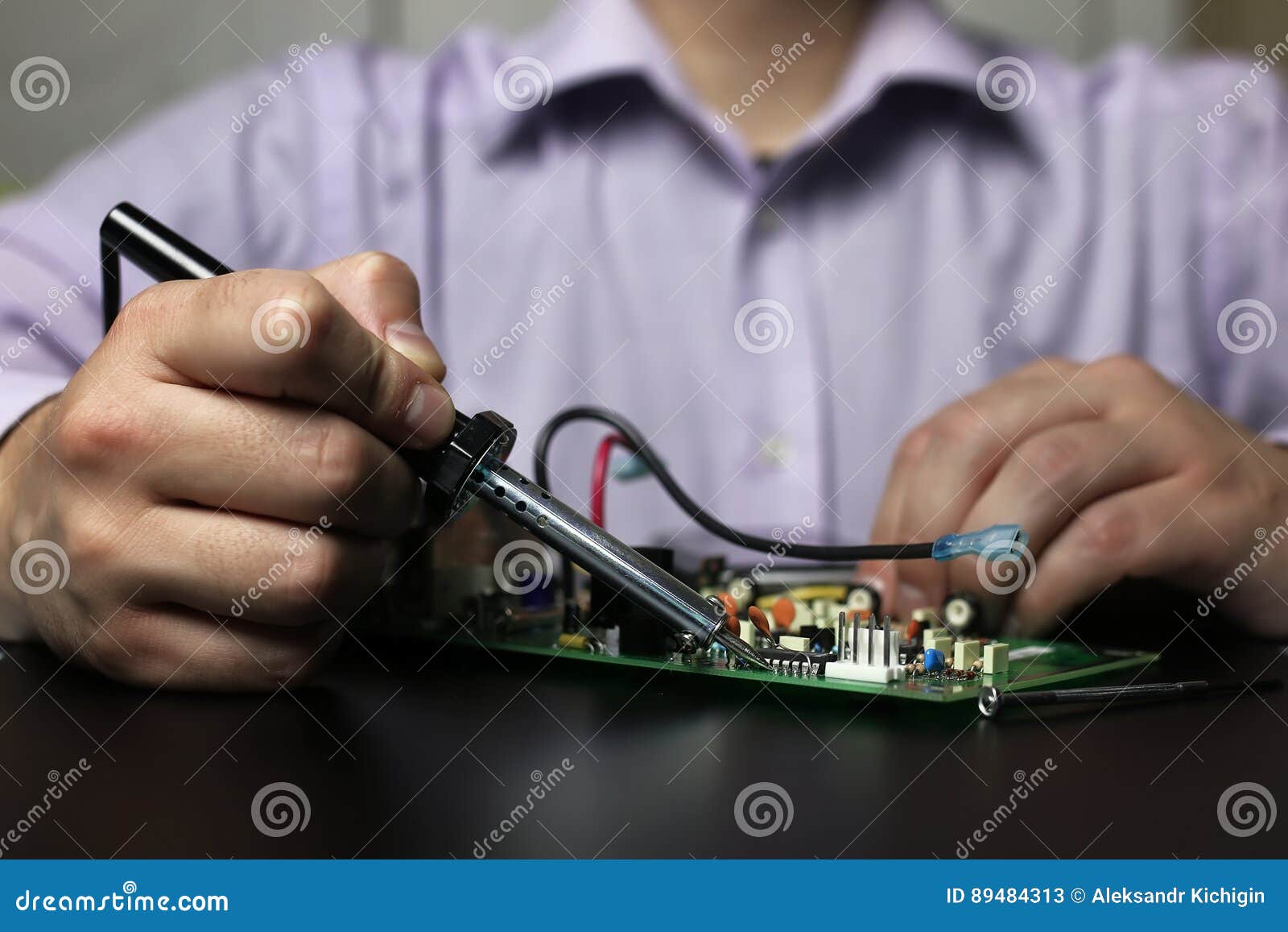 Chip soldering man hands stock image. Image of instrumentation - 89484313