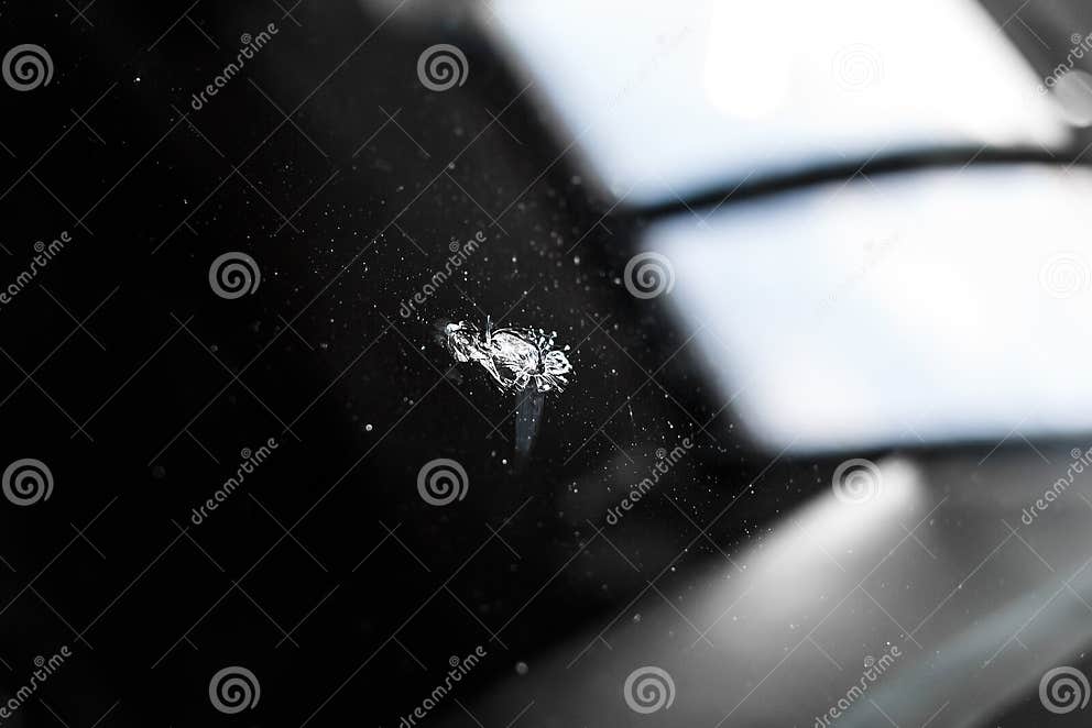 Chip from a Stone on the Windshield of the Car Stock Photo - Image of ...