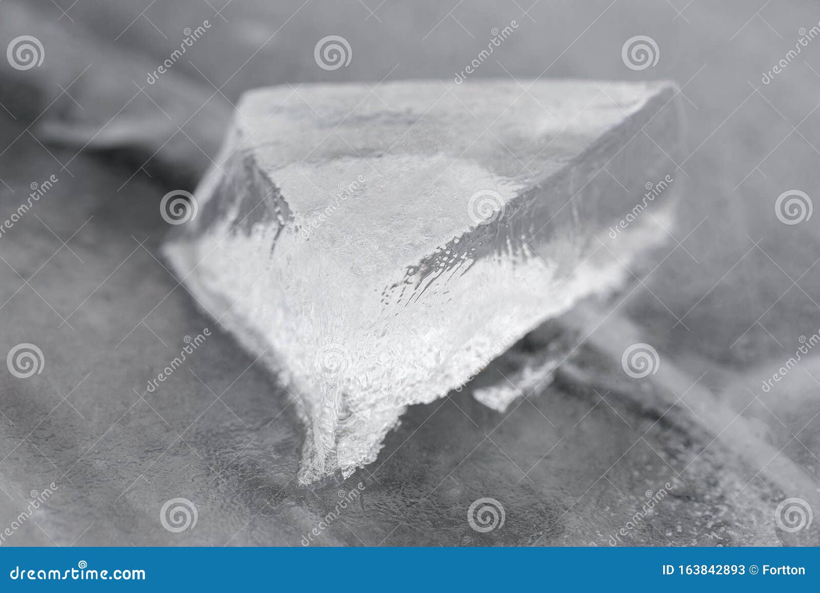 Chipped Piece of Ice on an Ice Surface Stock Image - Image of solid ...