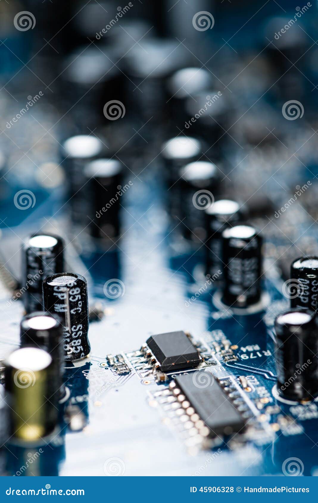 Chips on a blue PCB stock photo. Image of detail, electricity - 45906328