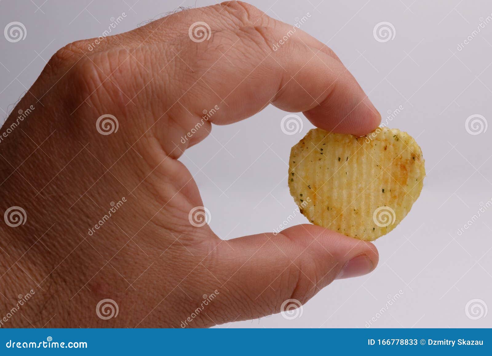 Chips heart in hand stock image. Image of closeup, calories - 166778833