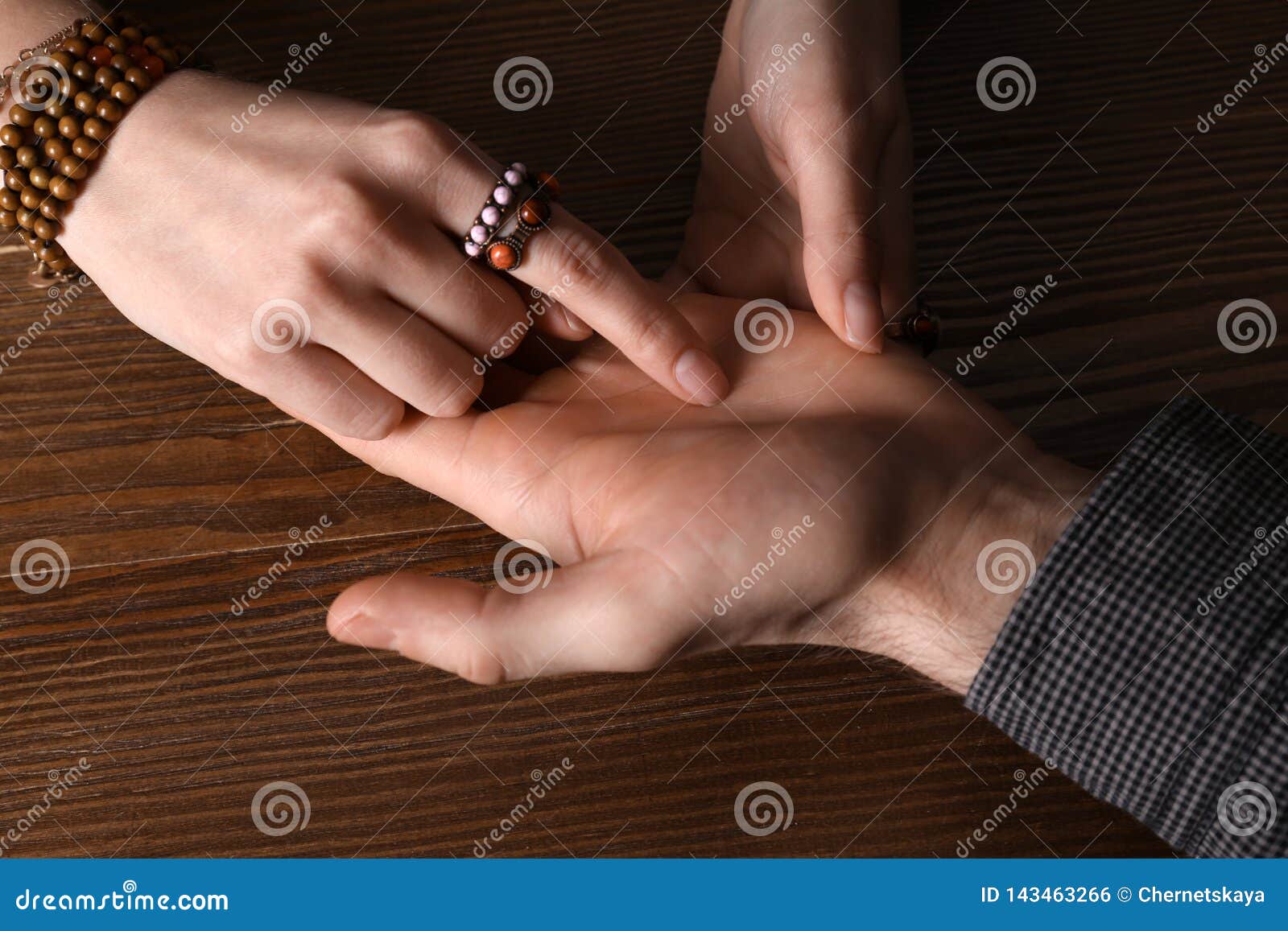 Chiromancer Reading Lines on Man`s Palm at Table Stock Photo - Image of ...