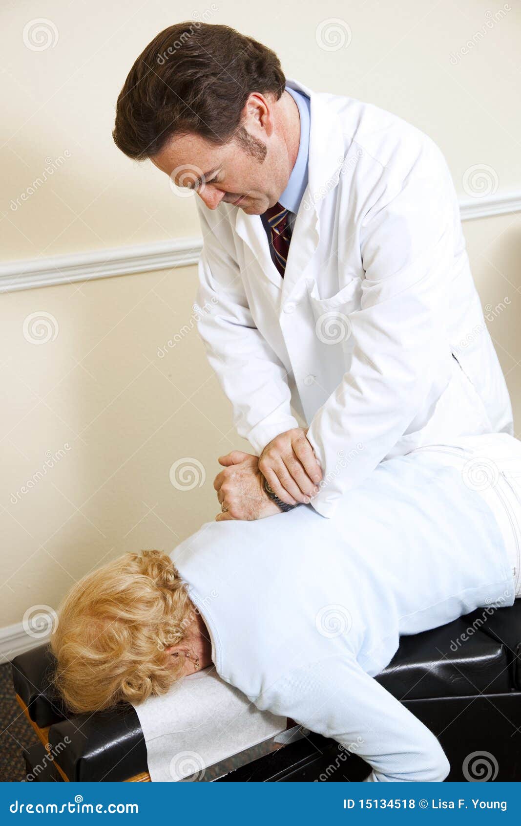 Chiropractor Aligning Vertebrae Stock Photo - Image of caring, people ...